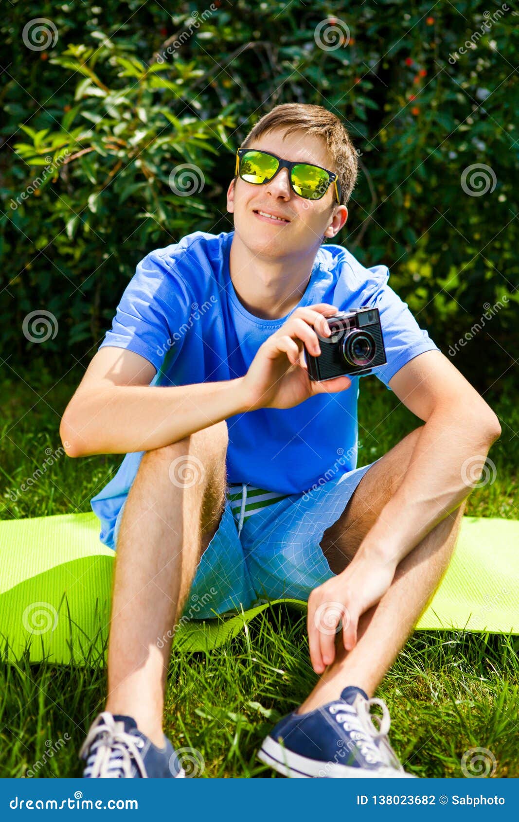 Man with a Camera stock photo. Image of grass, hold - 138023682