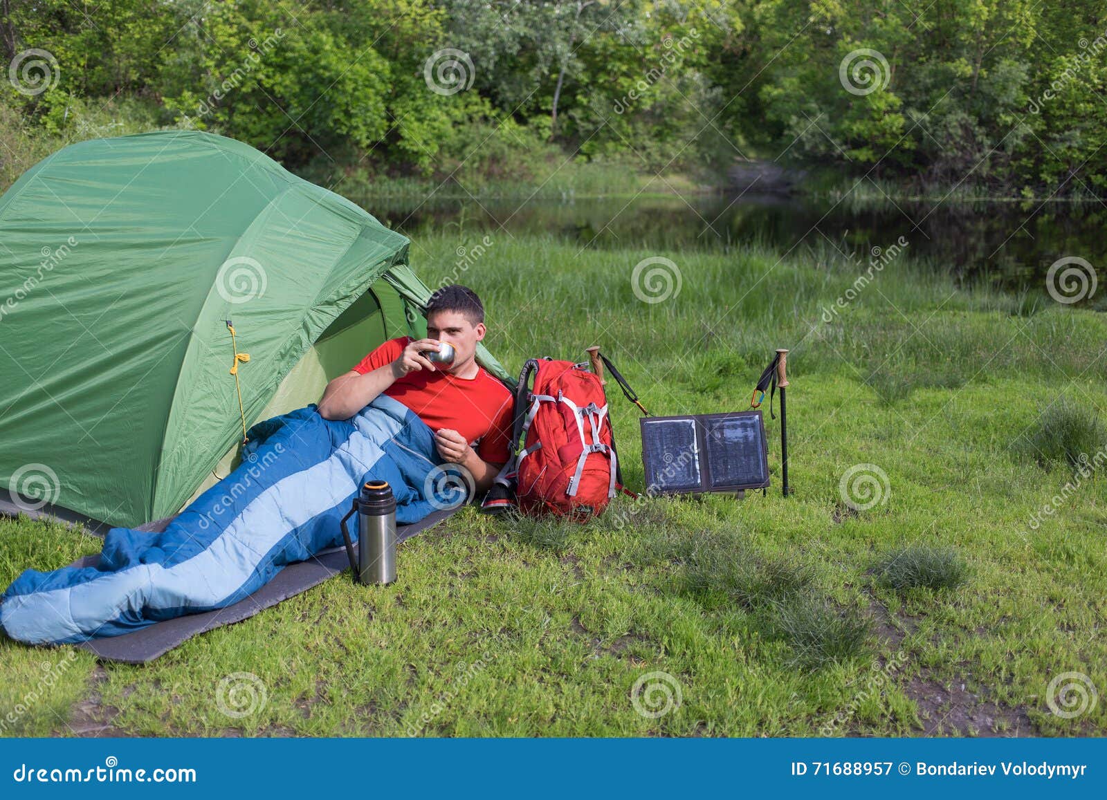 The Man at the Campsite in the Woods . Stock Image - Image of charging ...