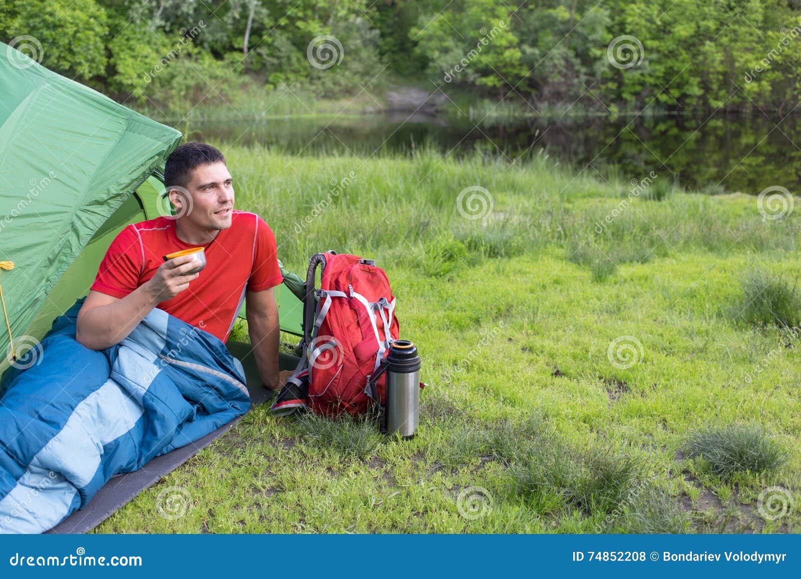 The Man at the Campsite in the Woods . Stock Photo - Image of camping ...