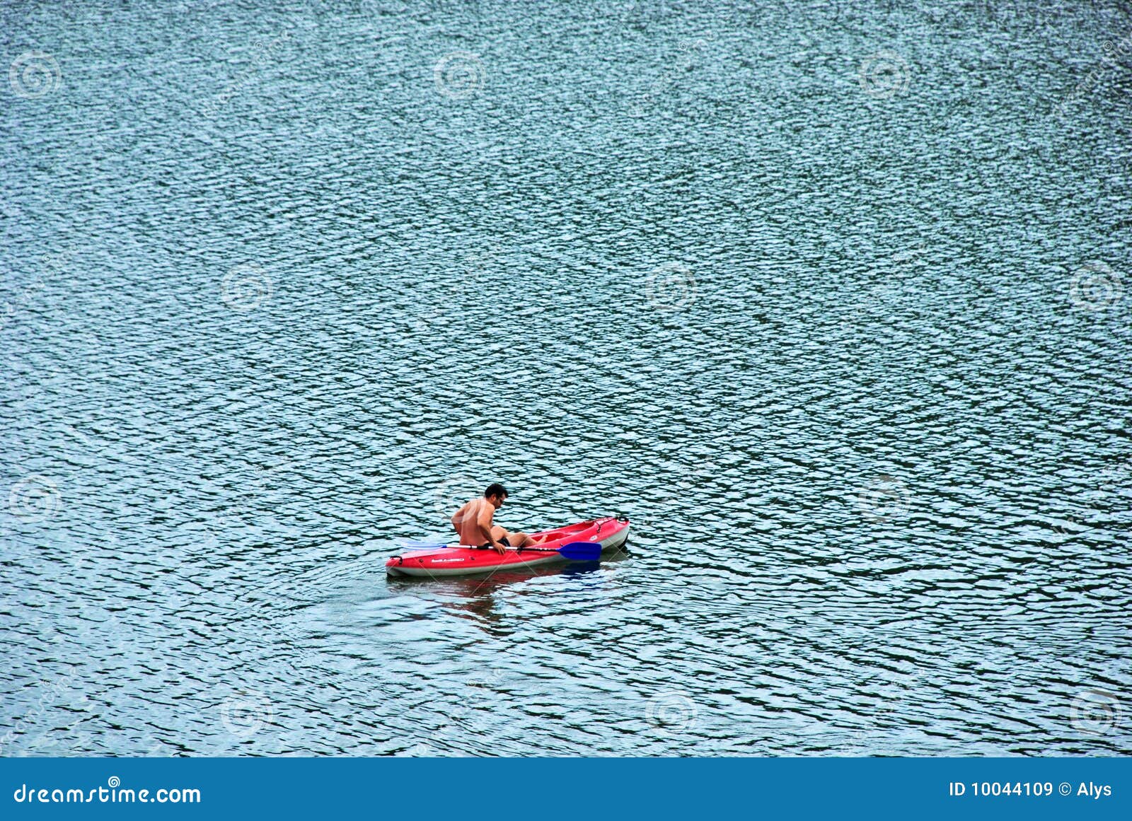 Man in canoe stock image. Image of kayak, paddling, beautiful - 10044109