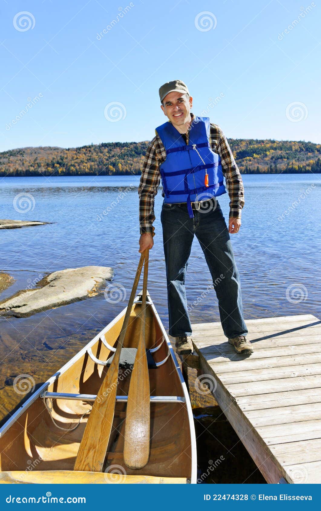 Man with canoe stock photo. Image of jacket, outdoors - 22474328