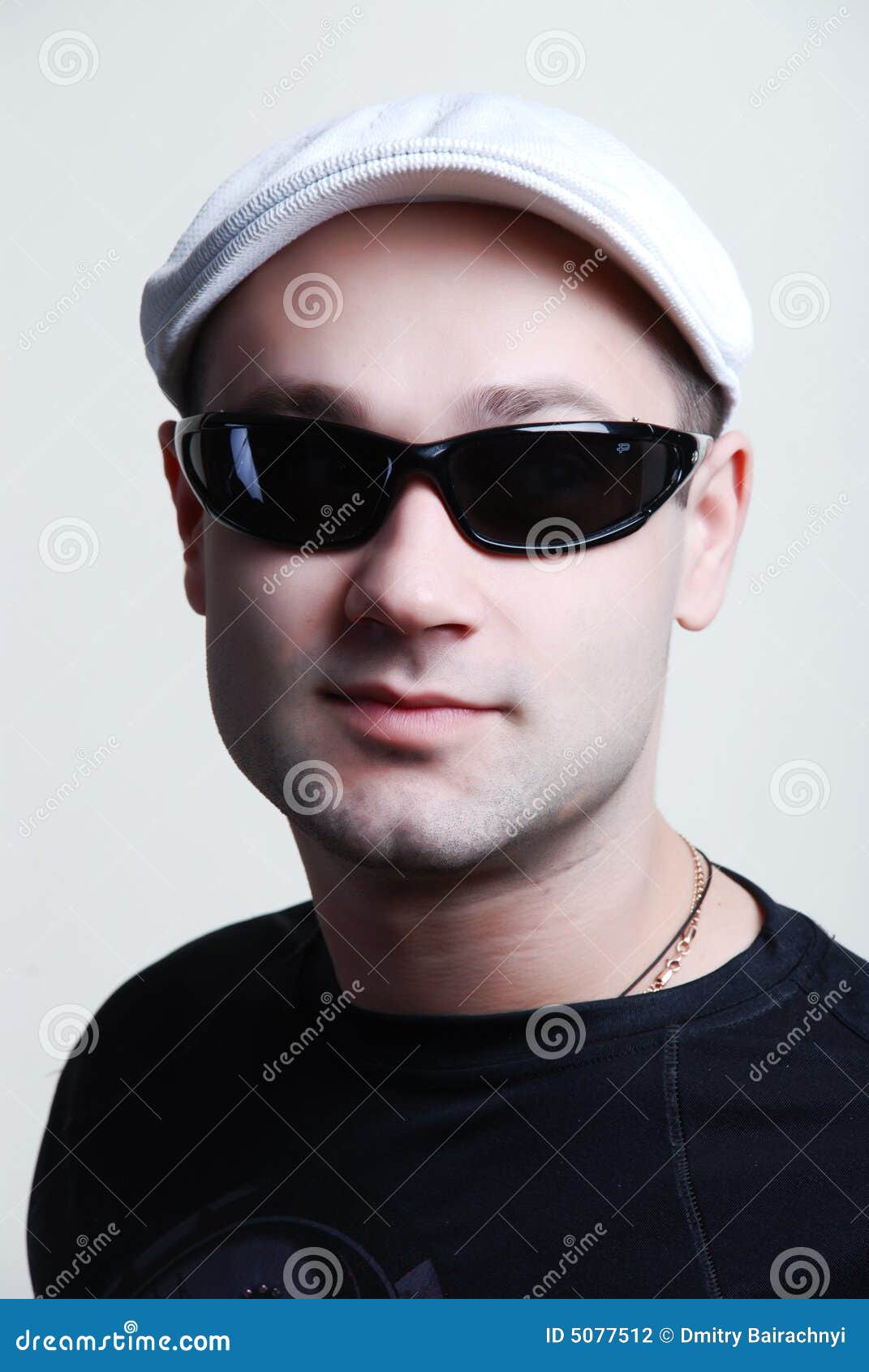 Man in cap stock photo. Image of portrait, white, clothing - 5077512