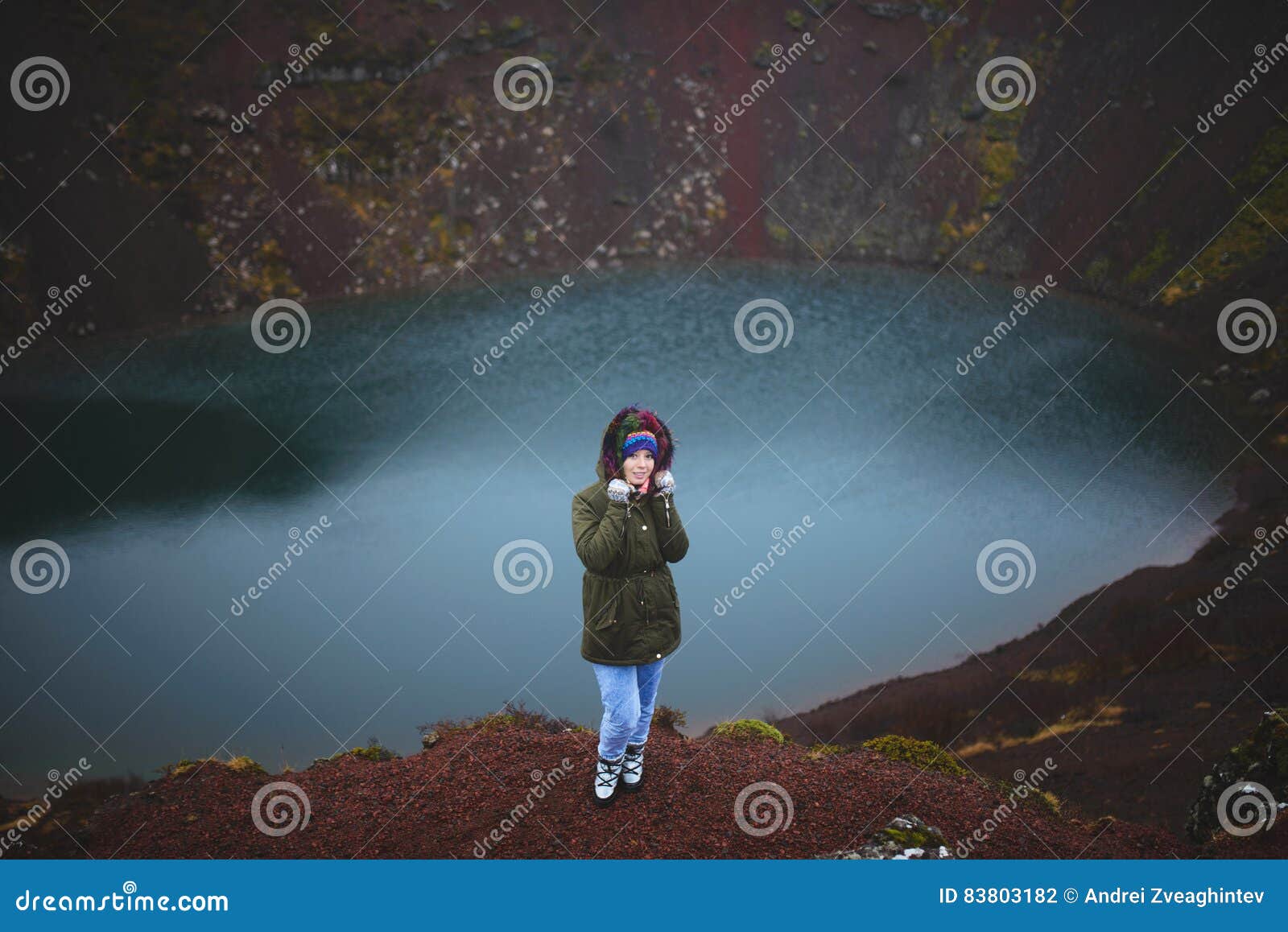 Man in Cap on Red Volcano Ground Stock Photo - Image of ground, couple ...