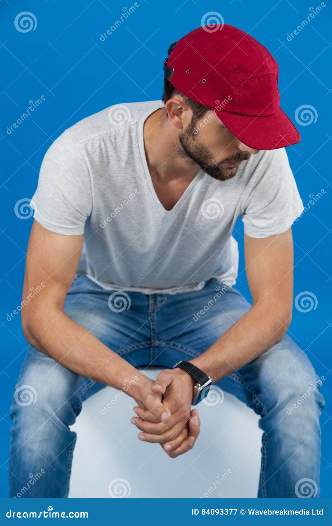Man in cap stock image. Image of clothing, male, wristwatch - 84093377