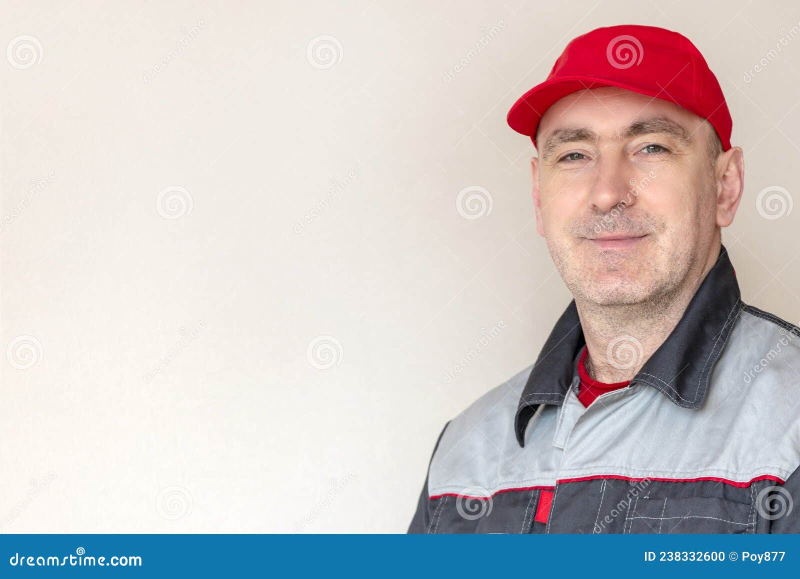 Man in a Cap and Work Clothes. Working Man, Professional, Foreman Stock ...