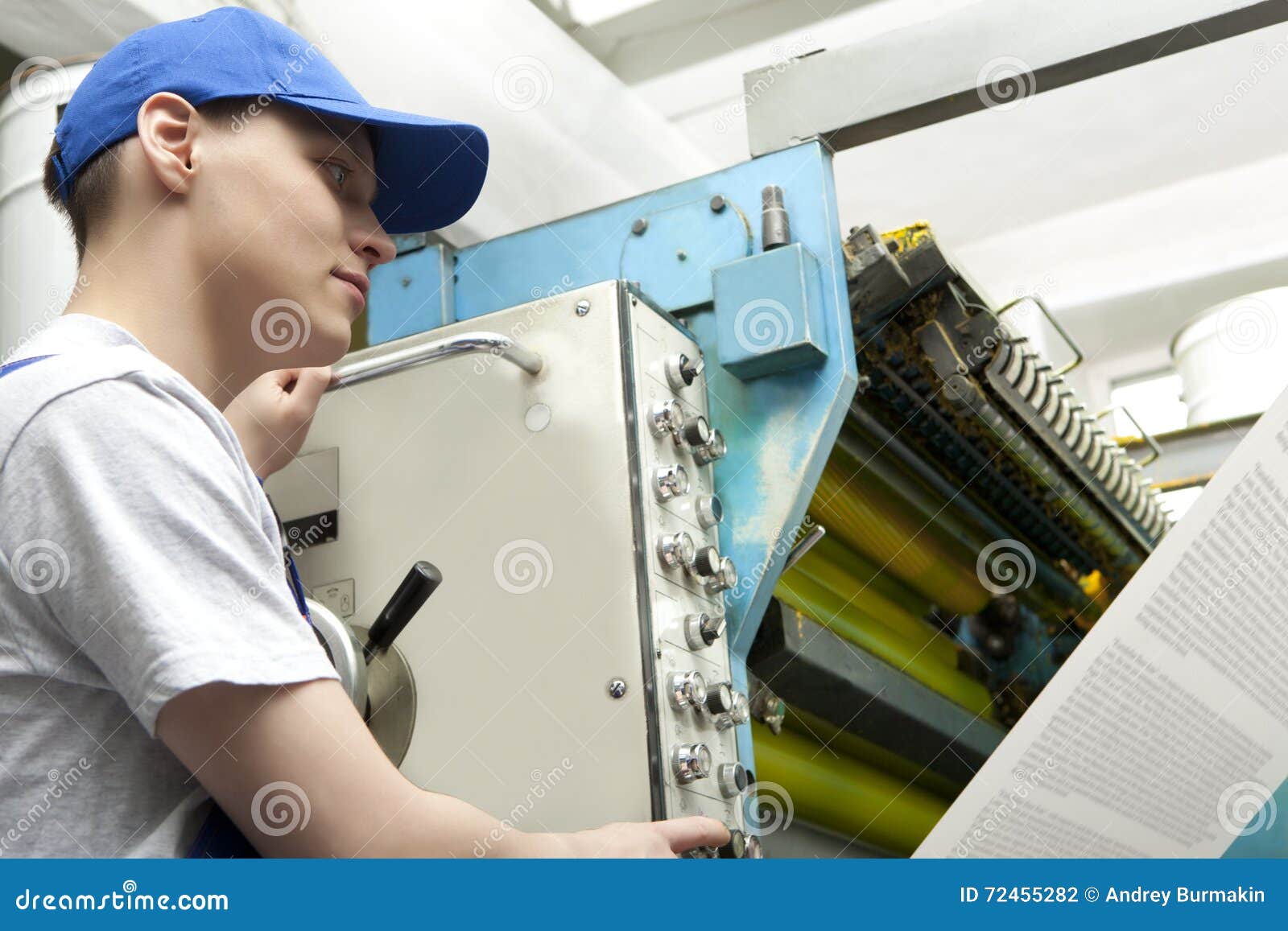 Man in Cap Working in Newspaper Factory Stock Photo - Image of ...