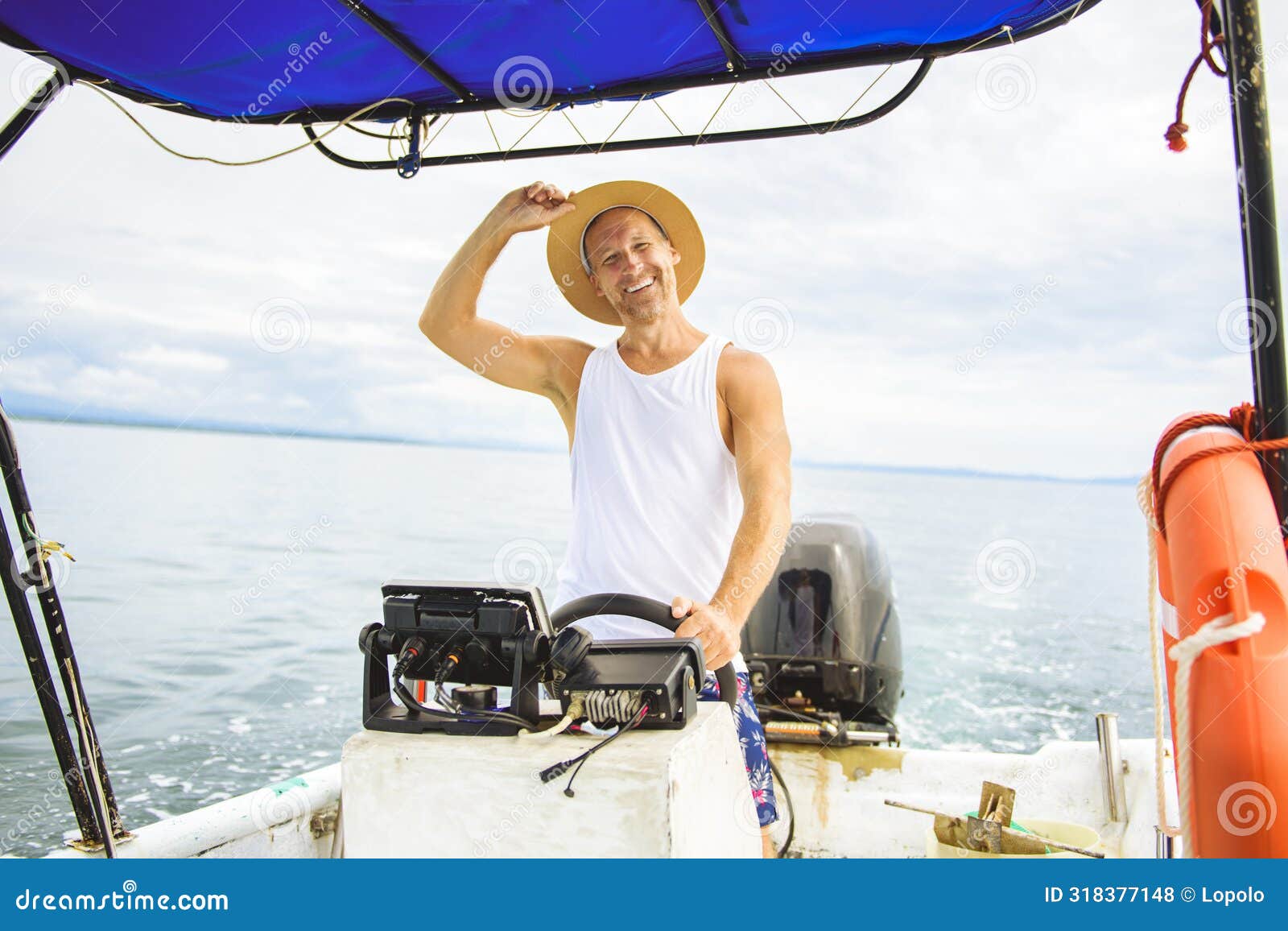 Man Captain Driving Boat on Ocean Tour Stock Photo - Image of dolphin ...
