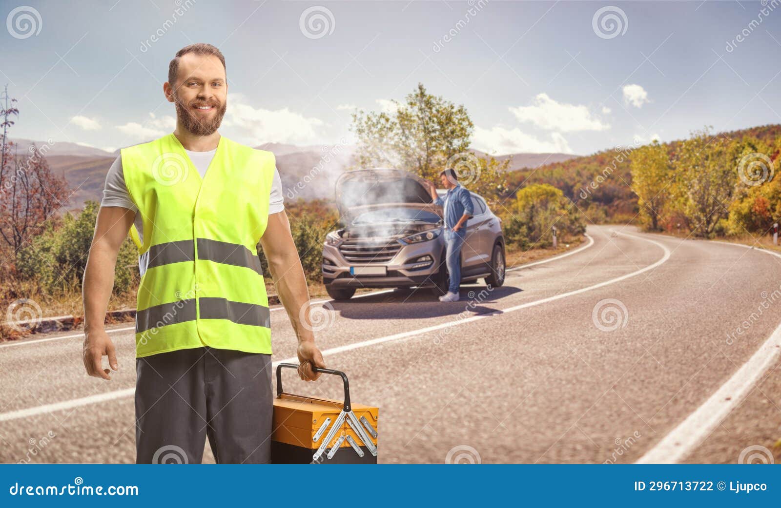 Man with a Car Breakdown on the Road and a Road Help Worker Holding a ...