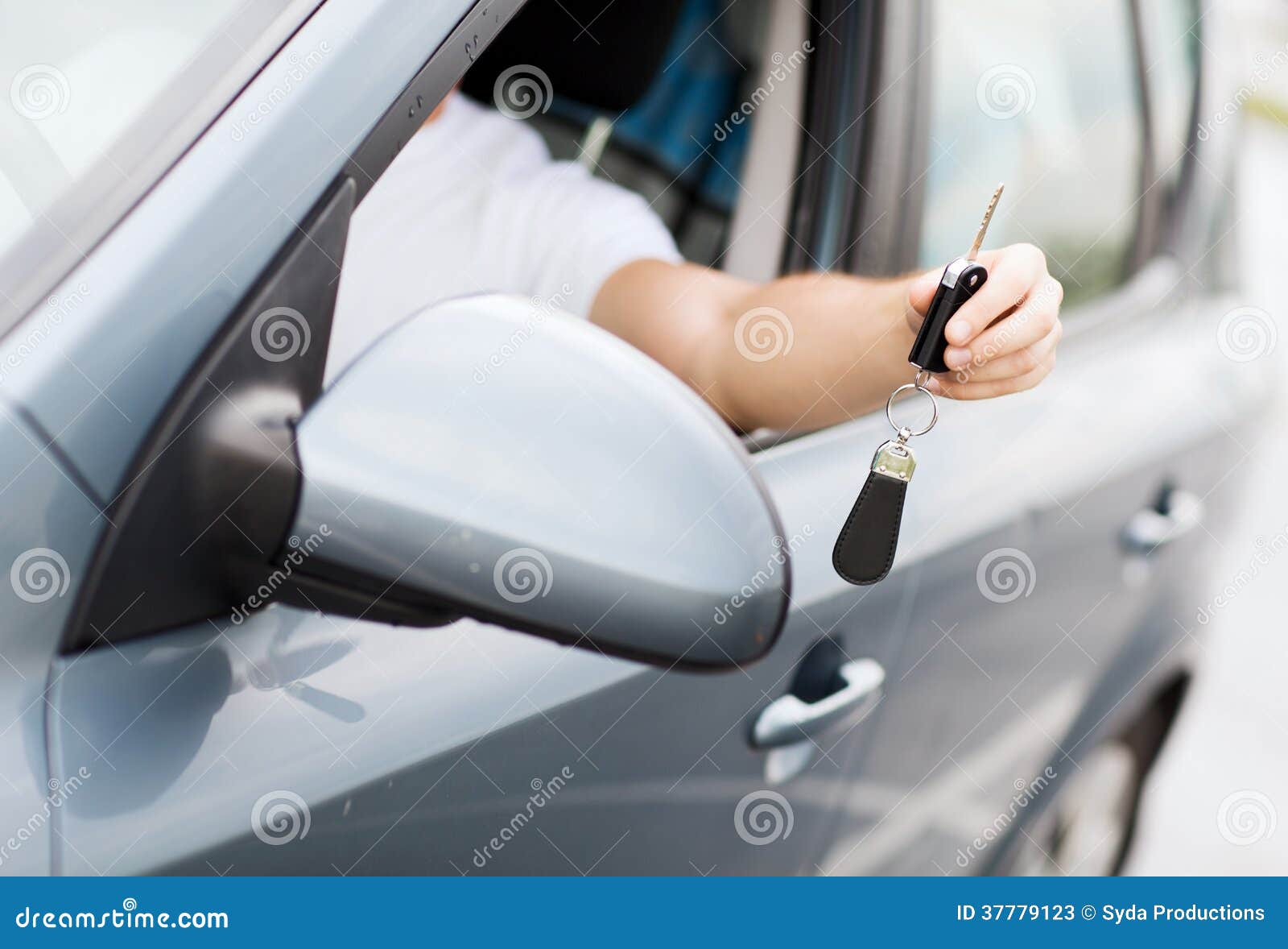 Man with car key outside stock image. Image of buying - 37779123