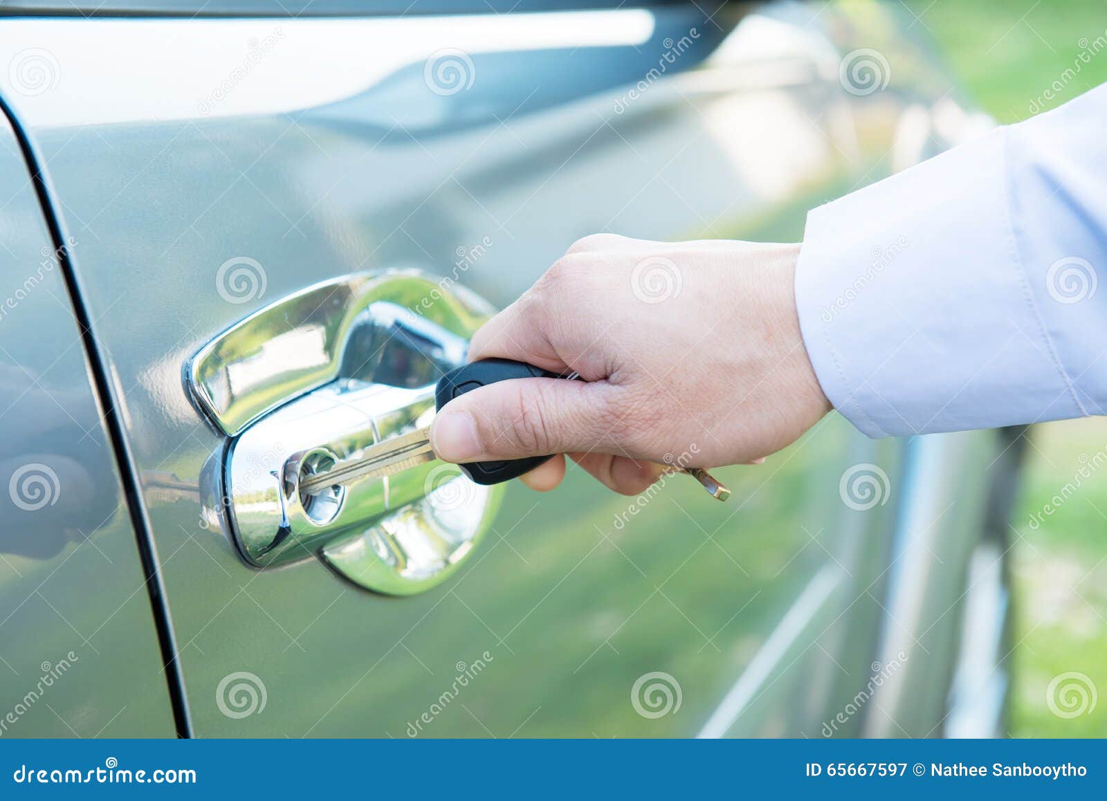 Man with Car Key Outside ,Insert the Key Open Door Car (finger Focused ...