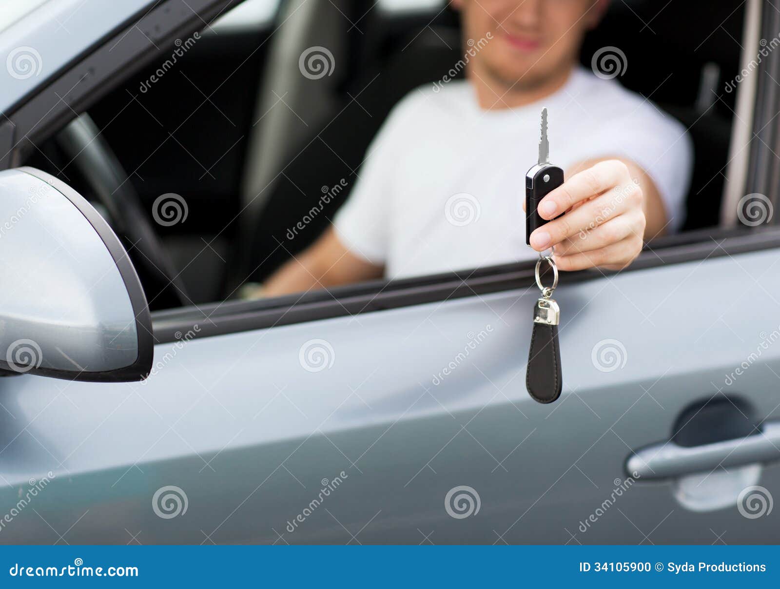 Man with car key outside stock photo. Image of hand, cheerful - 34105900
