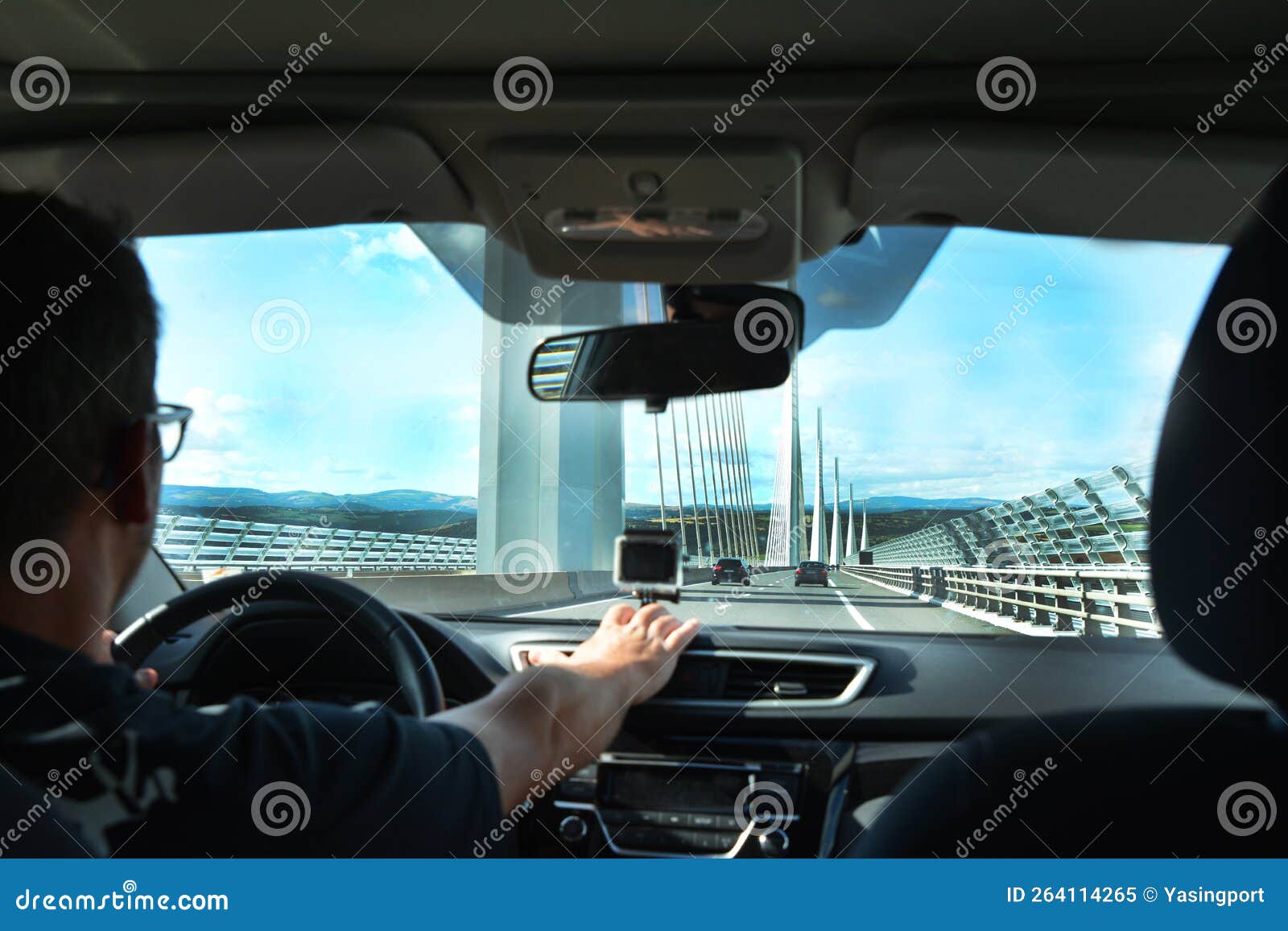 A Man in a Car on a Modern Bridge Stock Image - Image of downtown ...