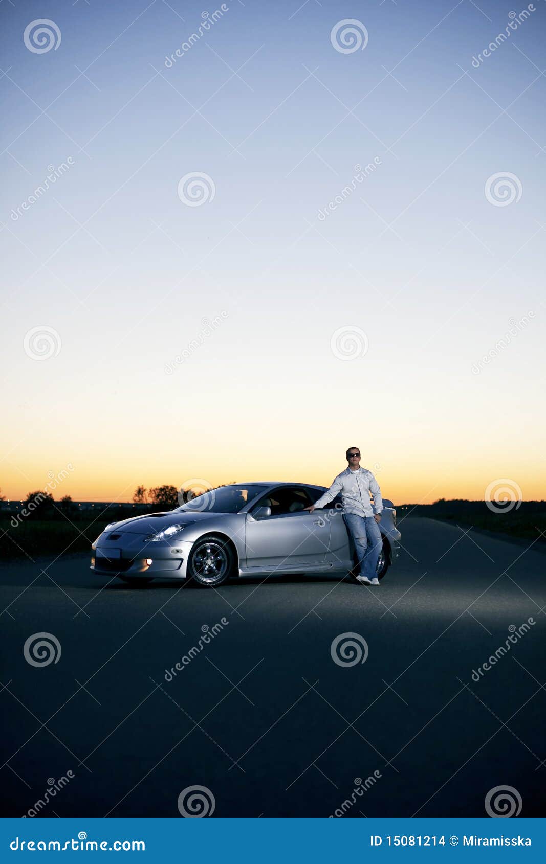 Man with a car at sunset stock photo. Image of elegance - 15081214