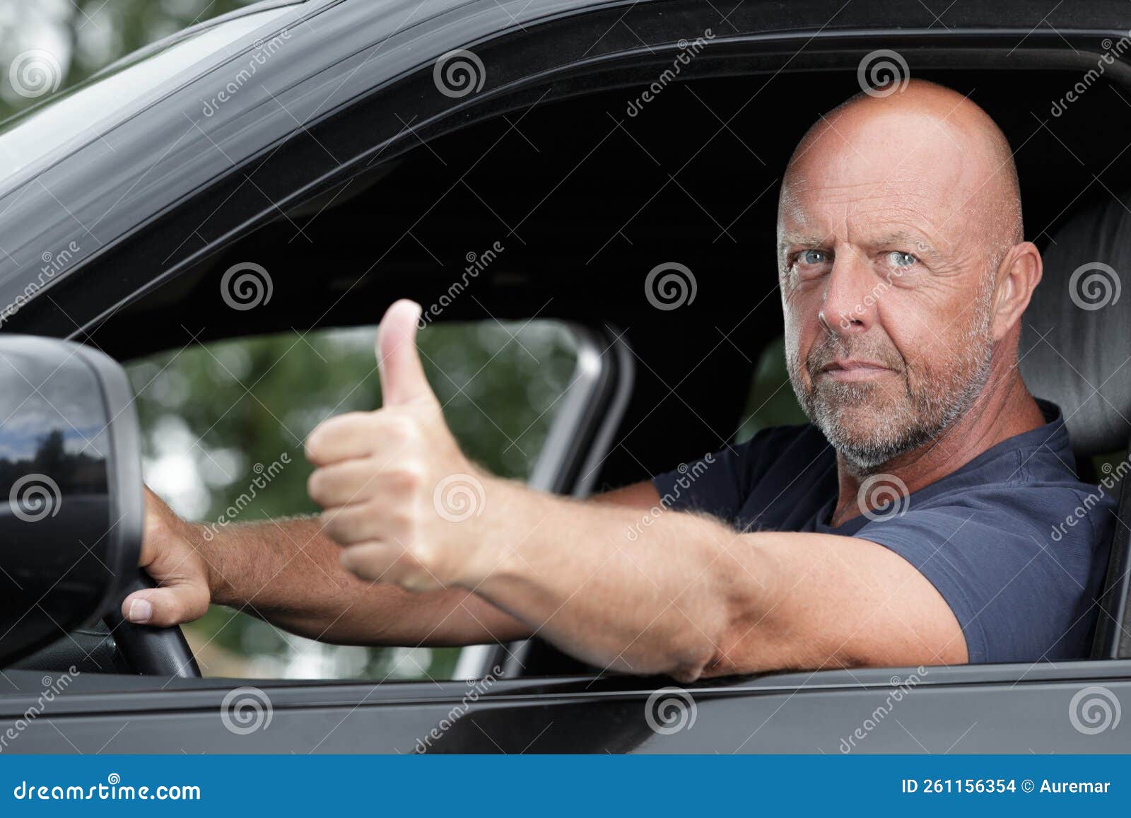 Man in car with thumbs up stock photo. Image of sitting - 261156354