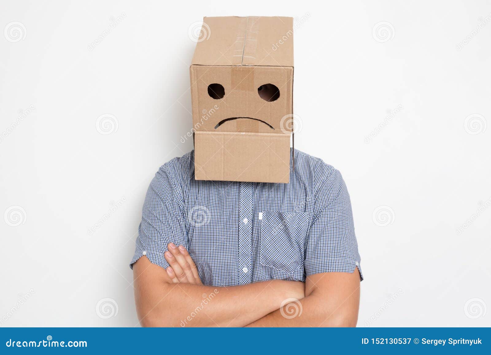 A Man with a Cardboard Box on His Head, a Sad Smiley Stock Image ...