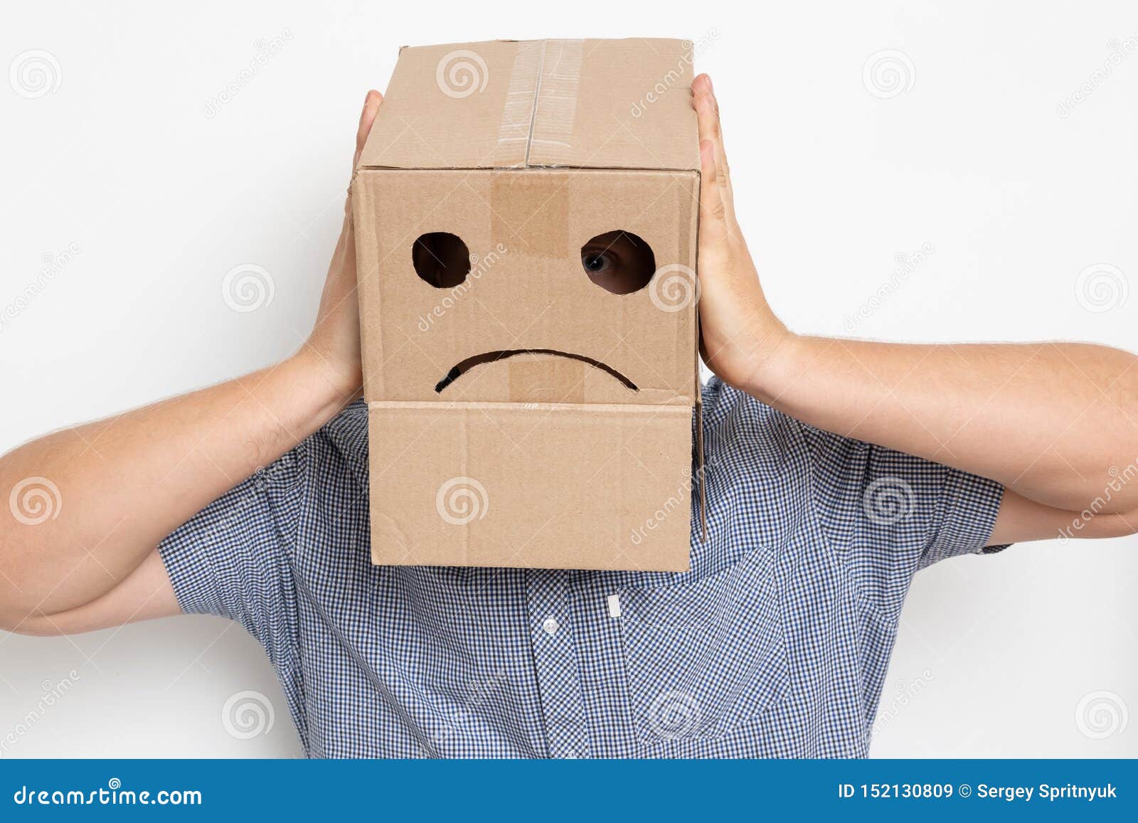 A Man with a Cardboard Box on His Head, a Sad Smiley Stock Image ...