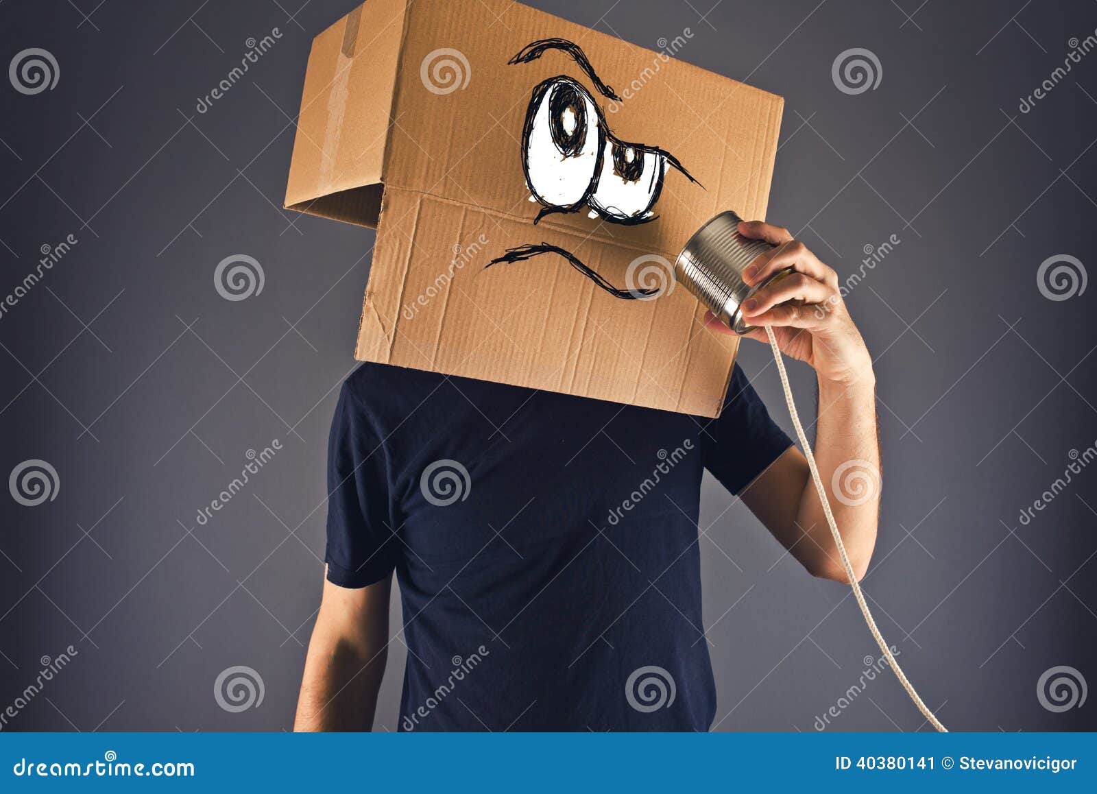 Man with Cardboard Box on His Head Using Tin Can Telephone Stock Image ...