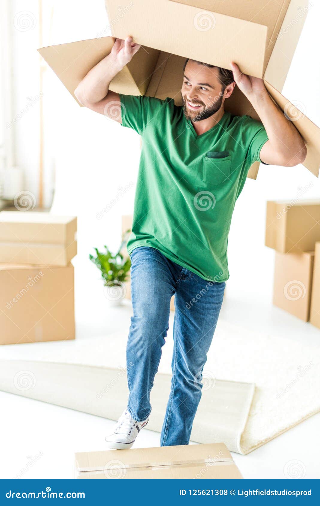 Man with cardboard box stock photo. Image of casual - 125621308