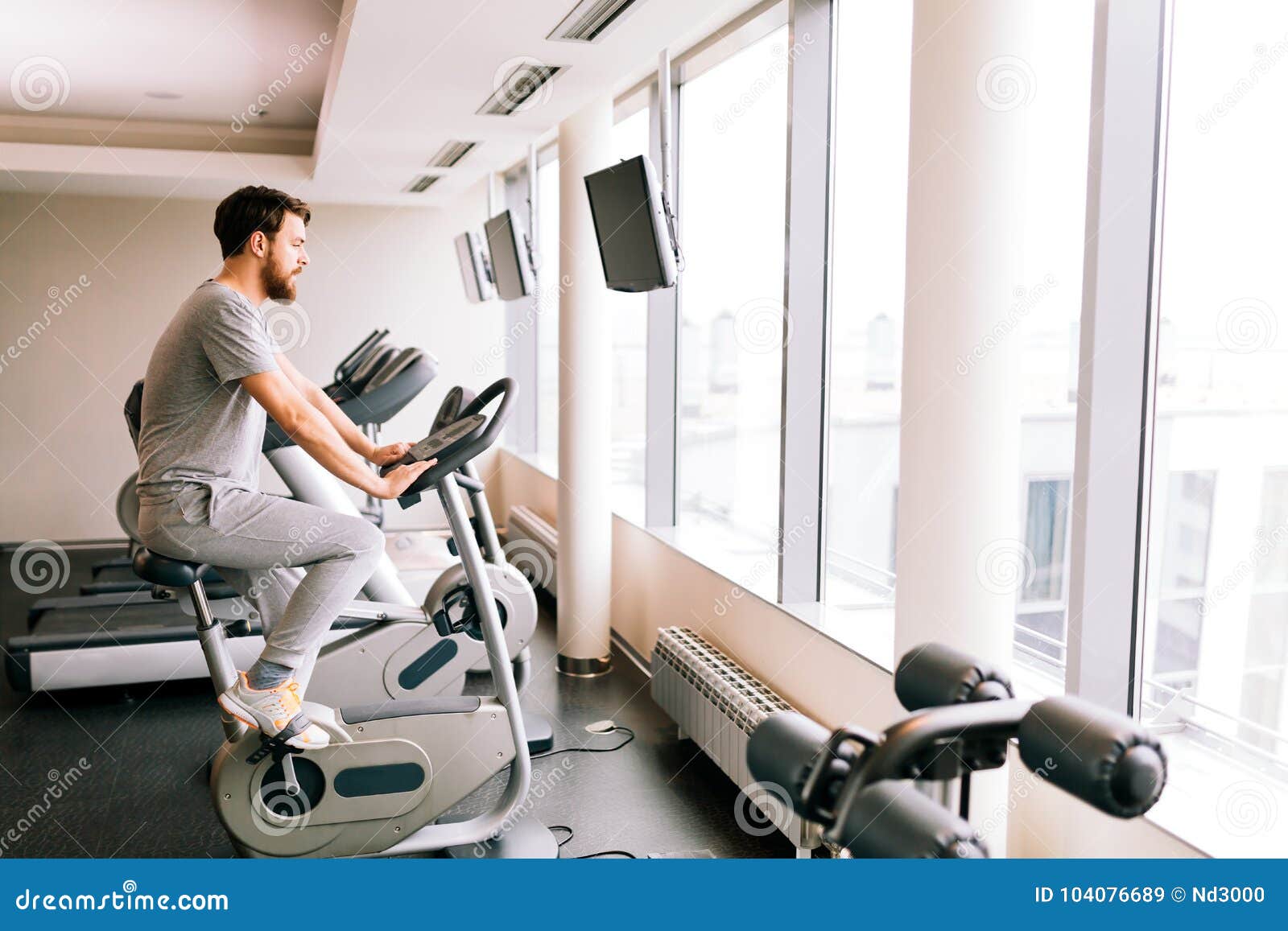 Man Cardio Training on a Bicycle Stock Image - Image of machine ...