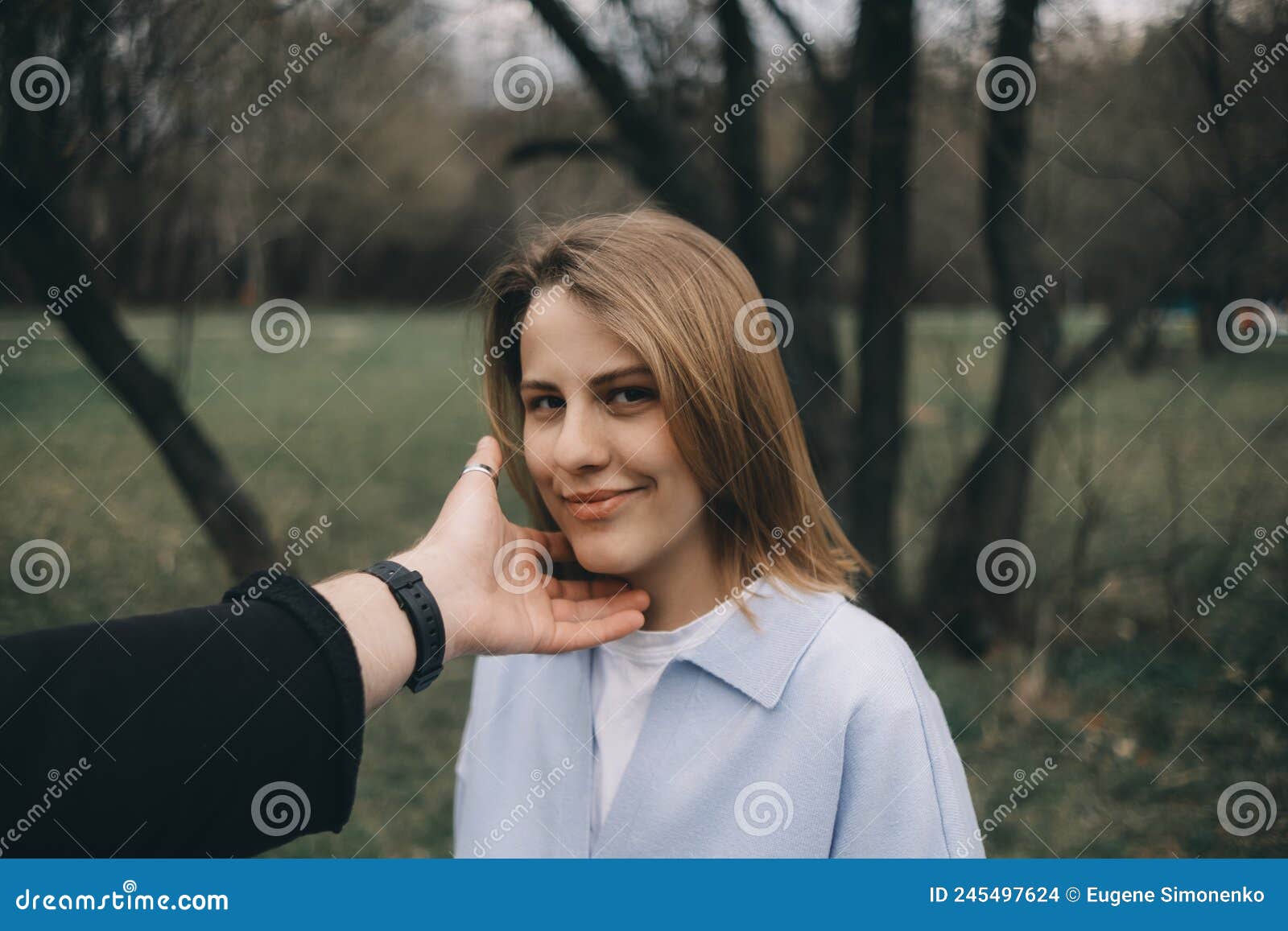 A Man Caresses the Face of His Beloved Outside. Stock Photo - Image of ...