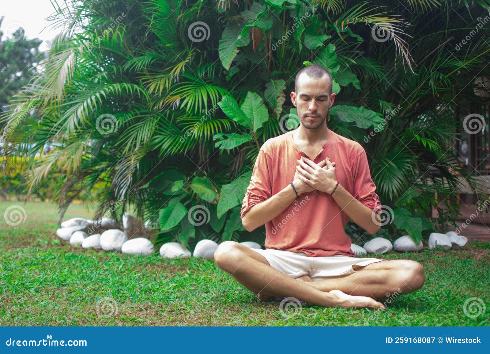 Man Caressing Himself in a Lotus Position Facing Forward Stock Image ...