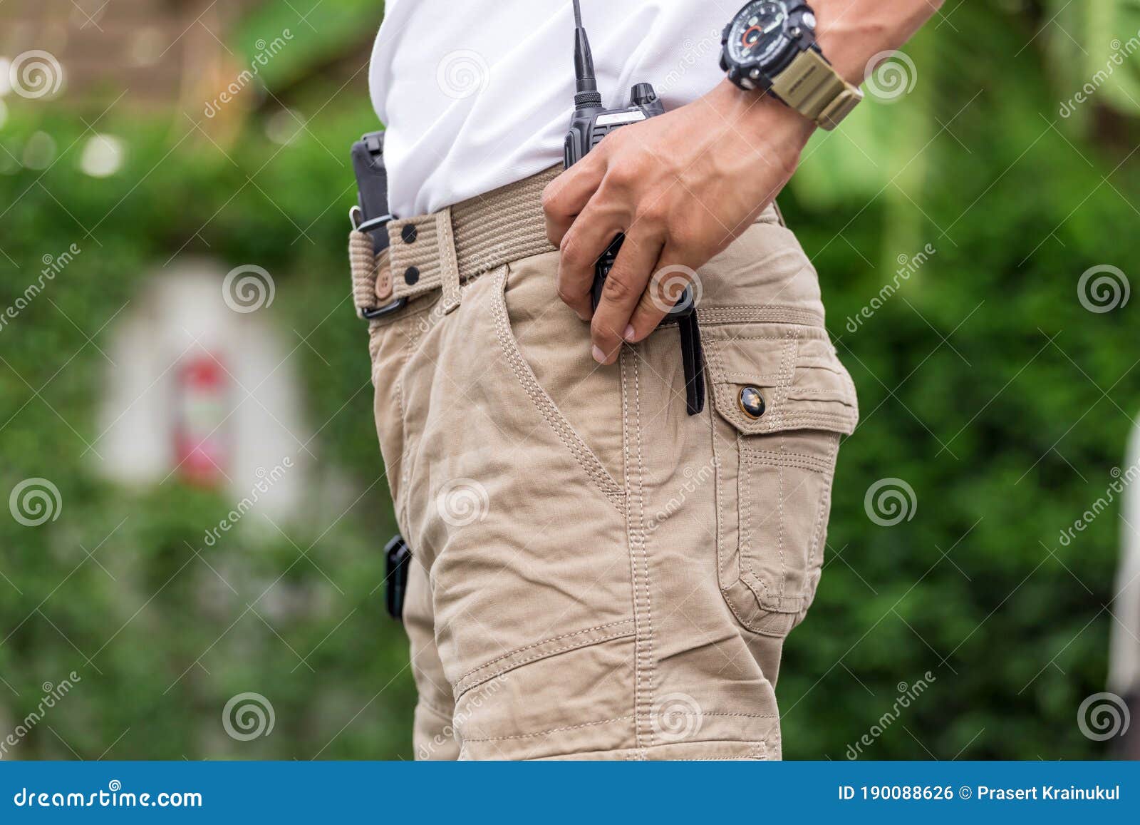 Man in Cargo Pants with Gun Stock Photo - Image of armed, police: 190088626