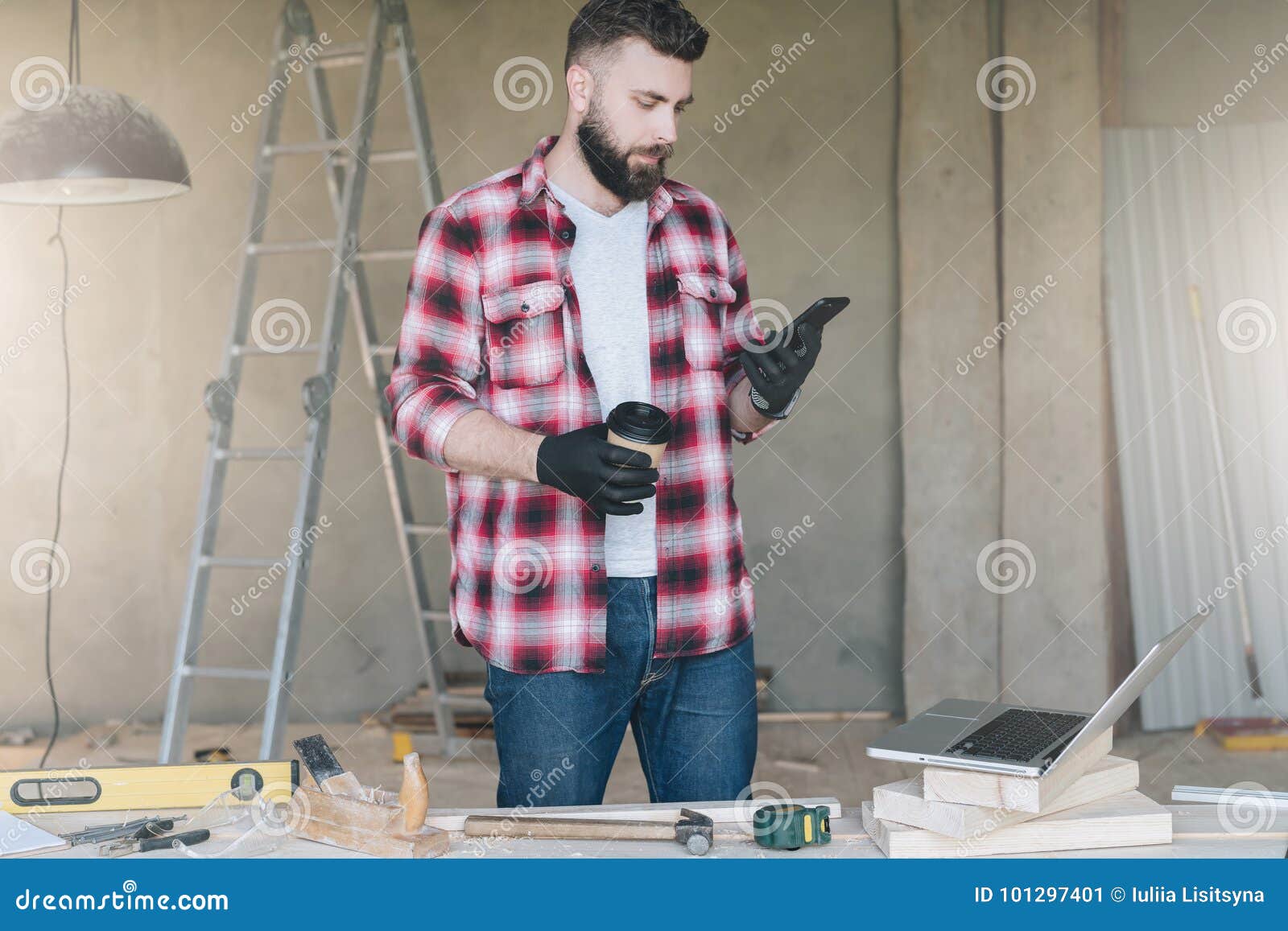 Man is Carpenter,builder,designer Stands in Workshop, Holds Cup Stock ...