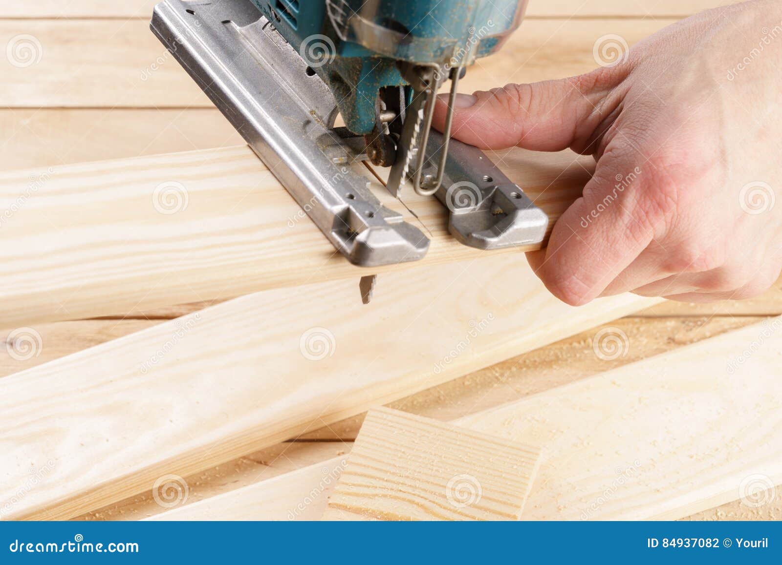 Man Carpenter Builder Working with Electric Jigsaw and Wood Stock Photo ...