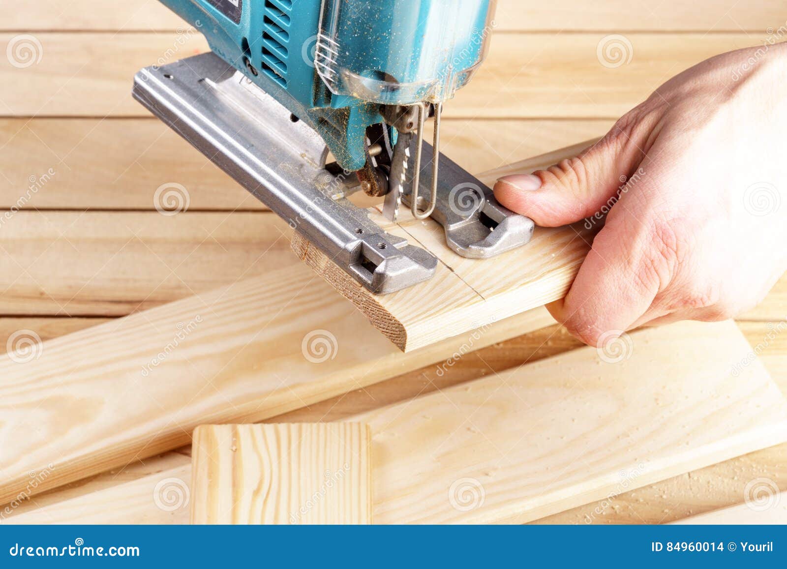 Man Carpenter Builder Working with Electric Jigsaw and Wood Stock Photo ...