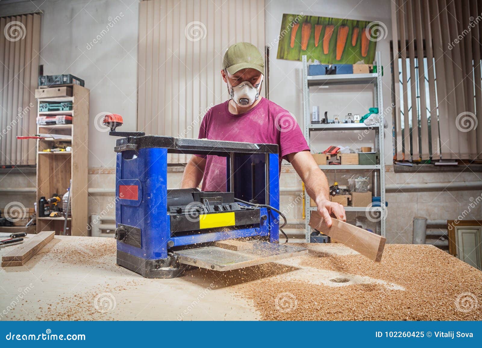 Man carpenter cut wooden stock image. Image of construction - 102260425