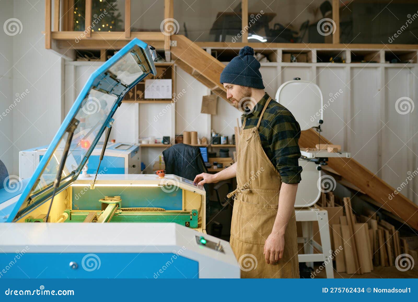 Man Carpenter Operating CNC Laser Machine in Automated Woodworking ...