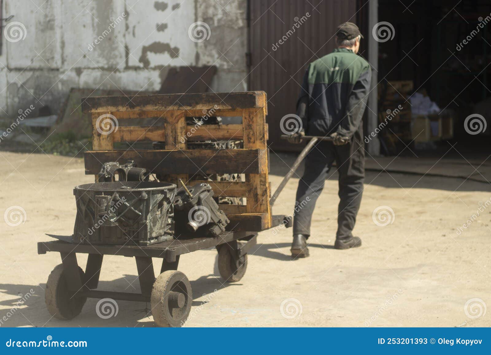 Man Carries Cart. Worker Pulls Load Editorial Stock Photo - Image of ...