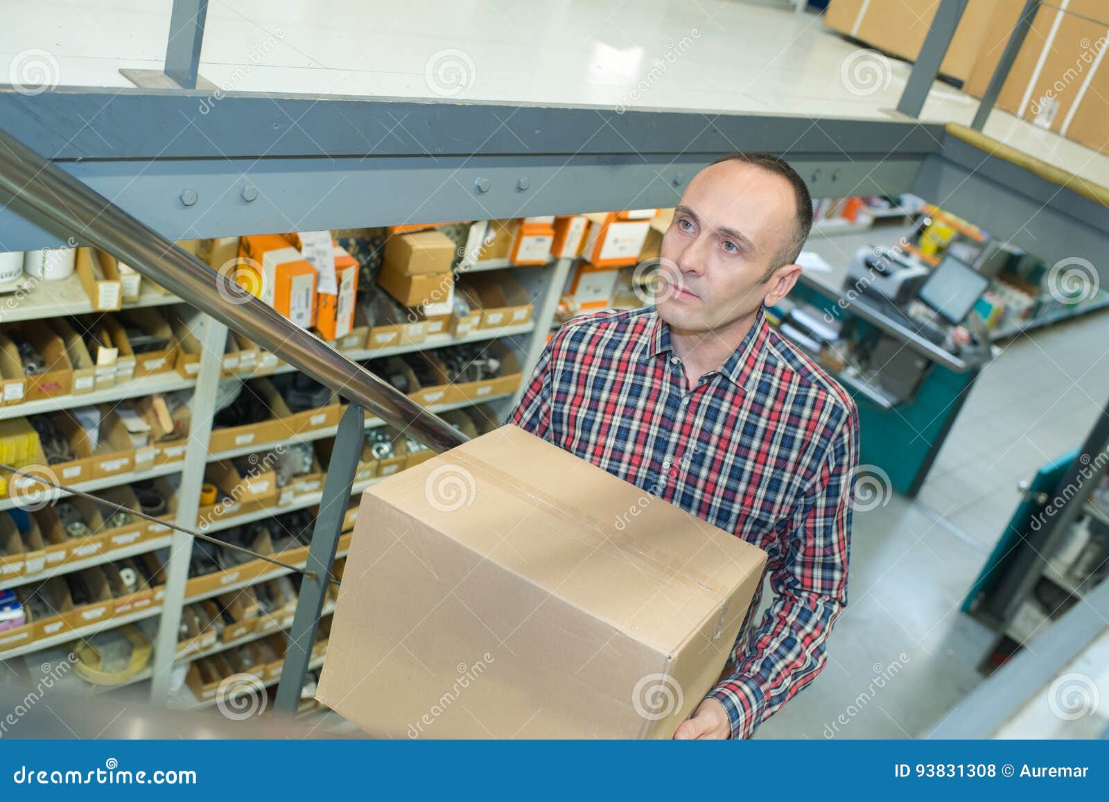 Man Carring Carton Box in Store Stock Photo - Image of studio, carrying ...