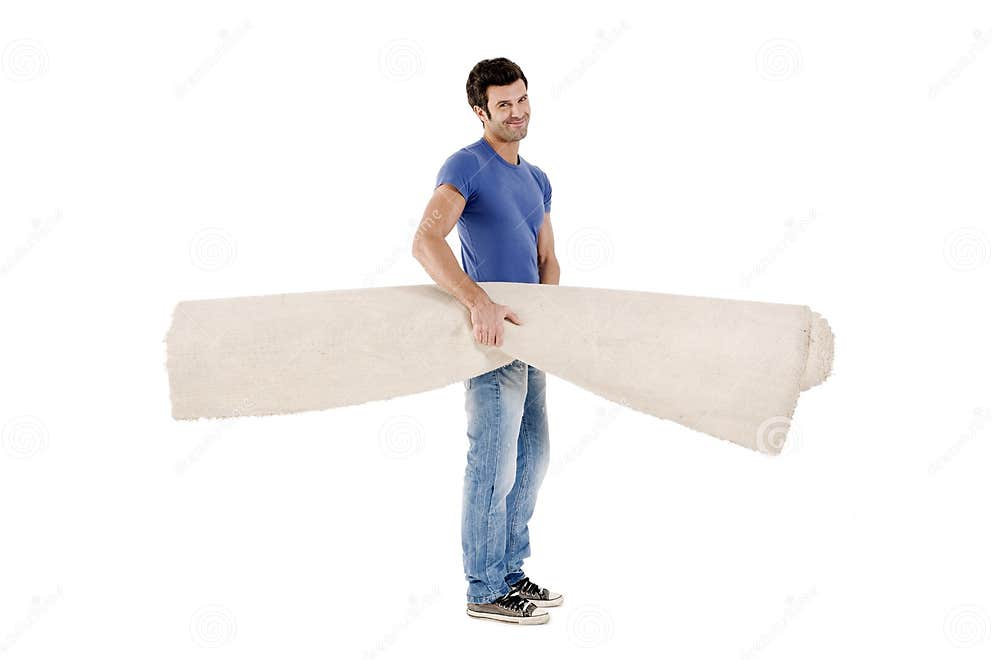 Man carrying a carpet stock image. Image of smile, carry - 17992599