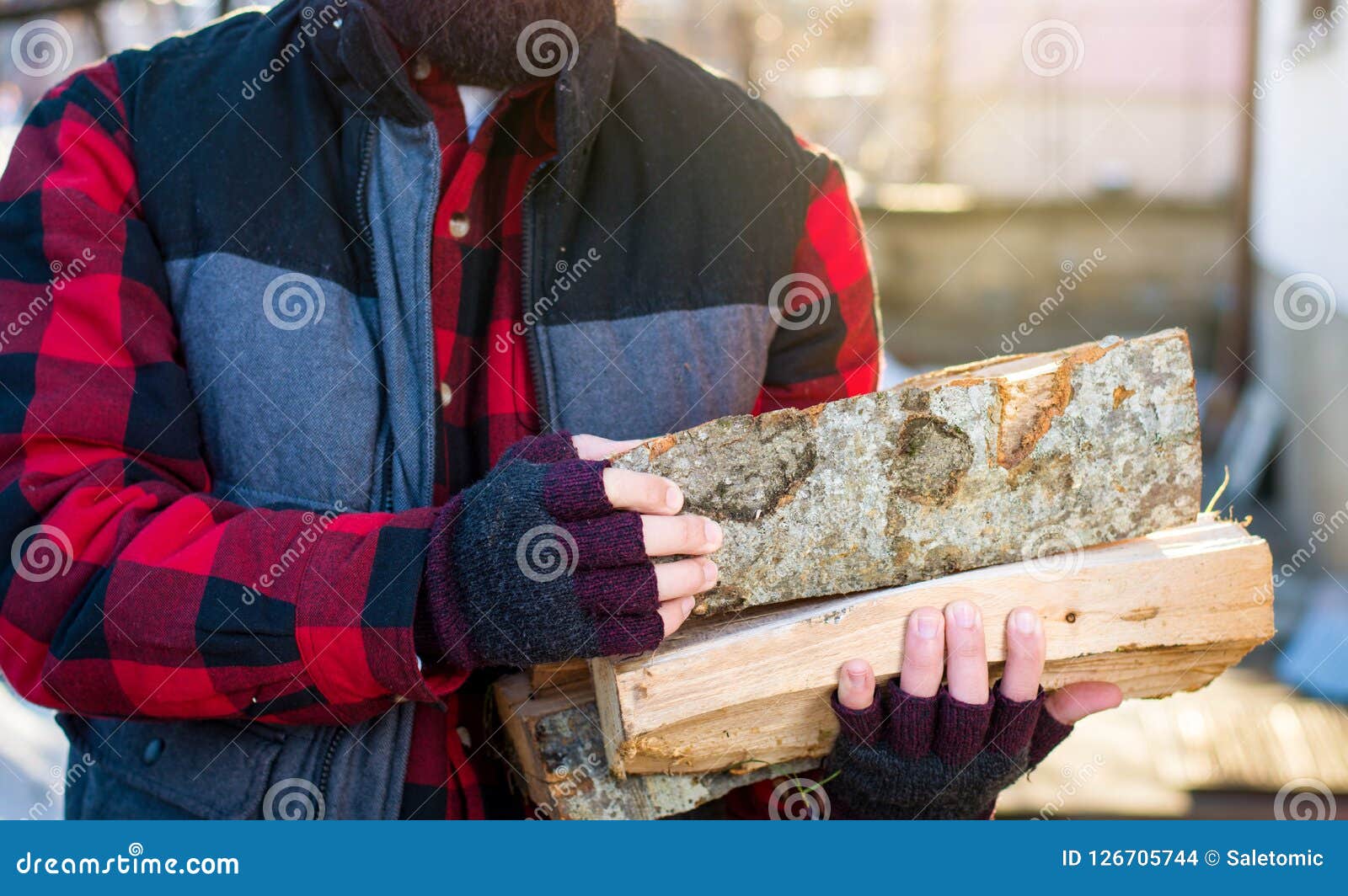 Man Carrying Firewood in the Yard Stock Photo - Image of firewood, male ...