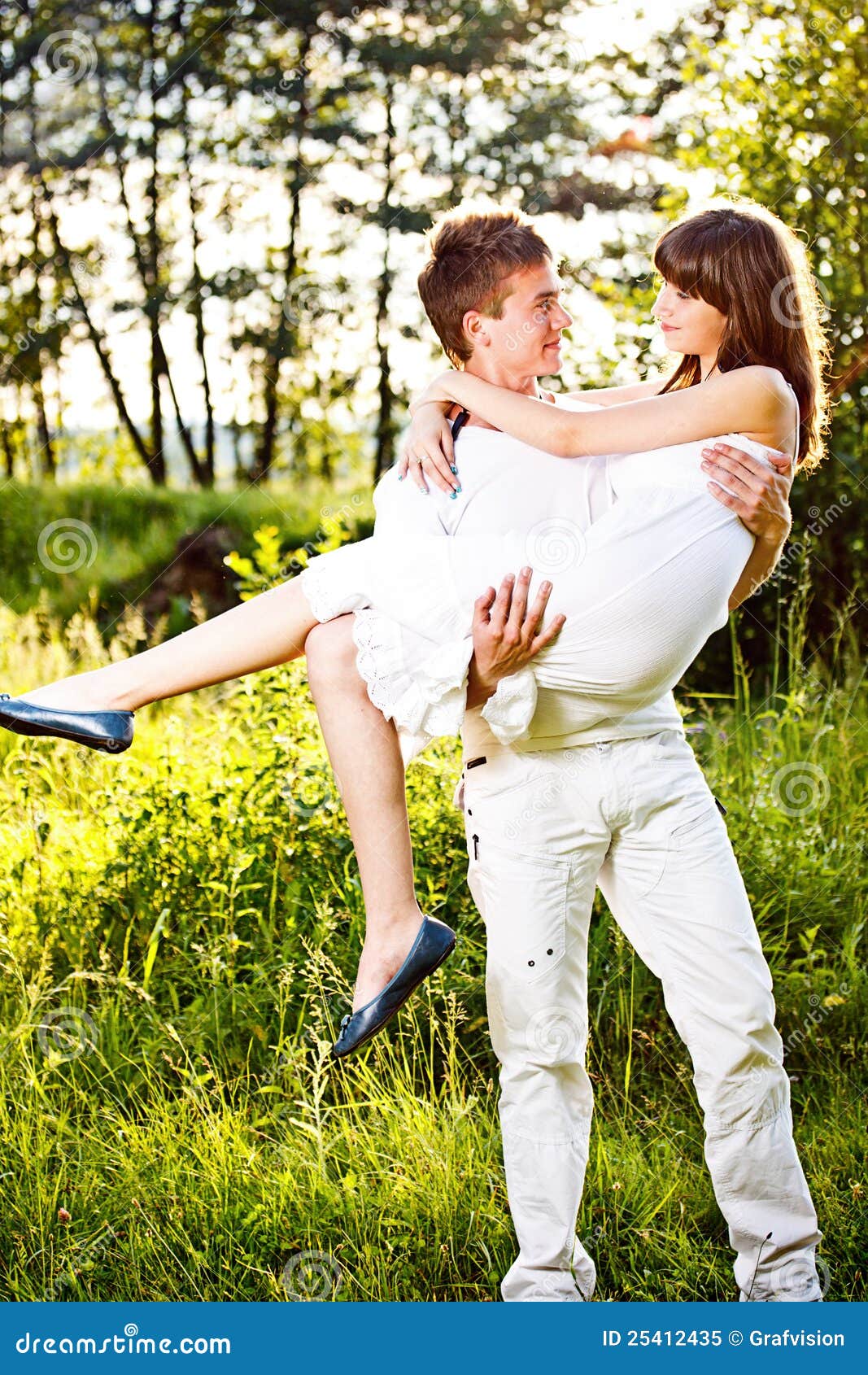 Man Carrying Girlfriend In His Arms Royalty-Free Stock Photography ...