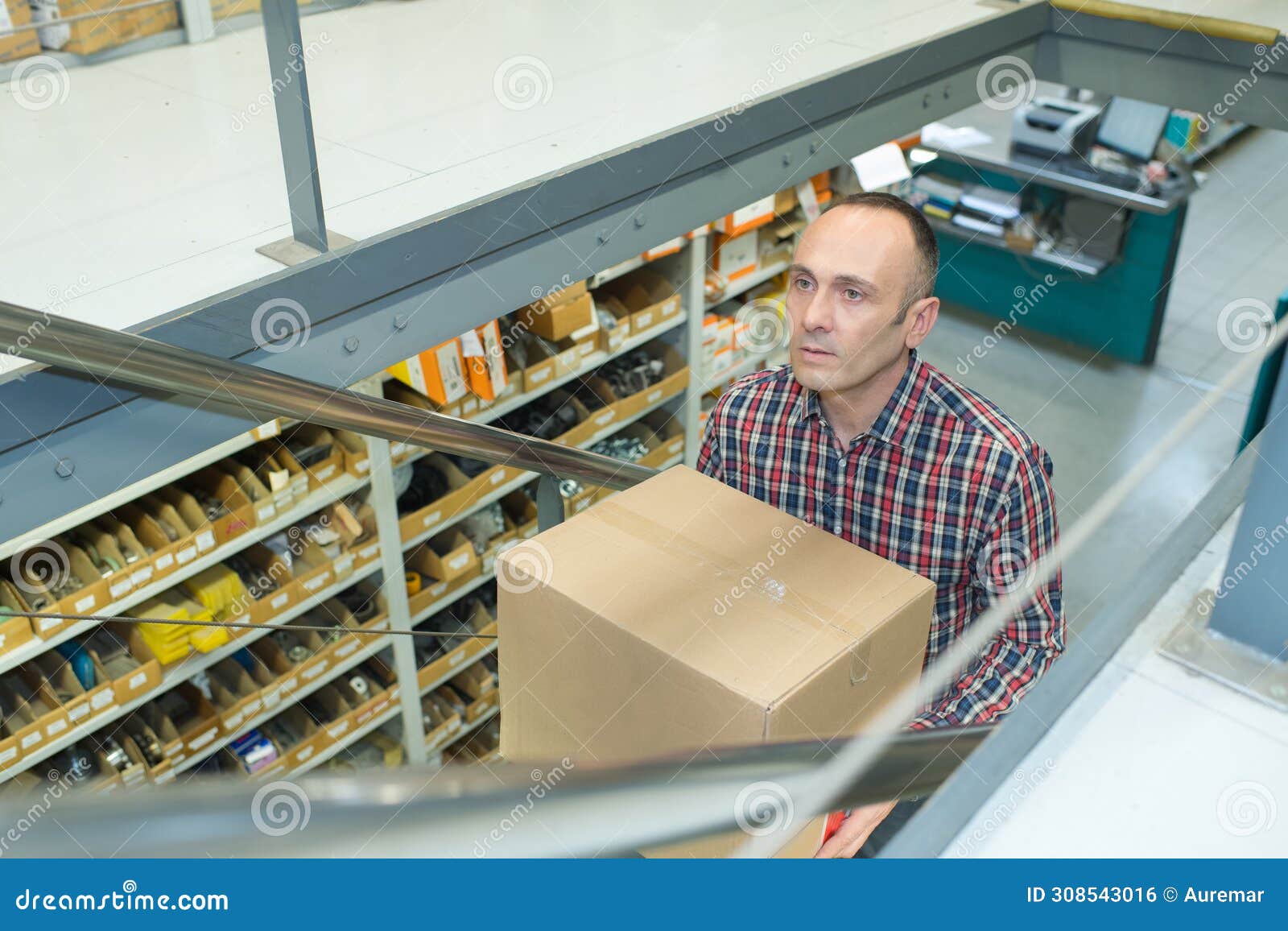 Man Carrying Large Heavy Box on Back Upstairs Stock Photo - Image of ...