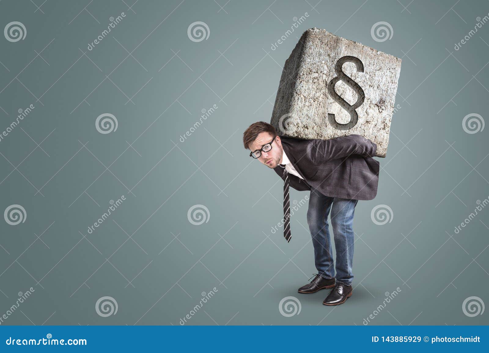 Man Carrying a Large Stone Engraved with a Paragraph Symbol Stock Image ...