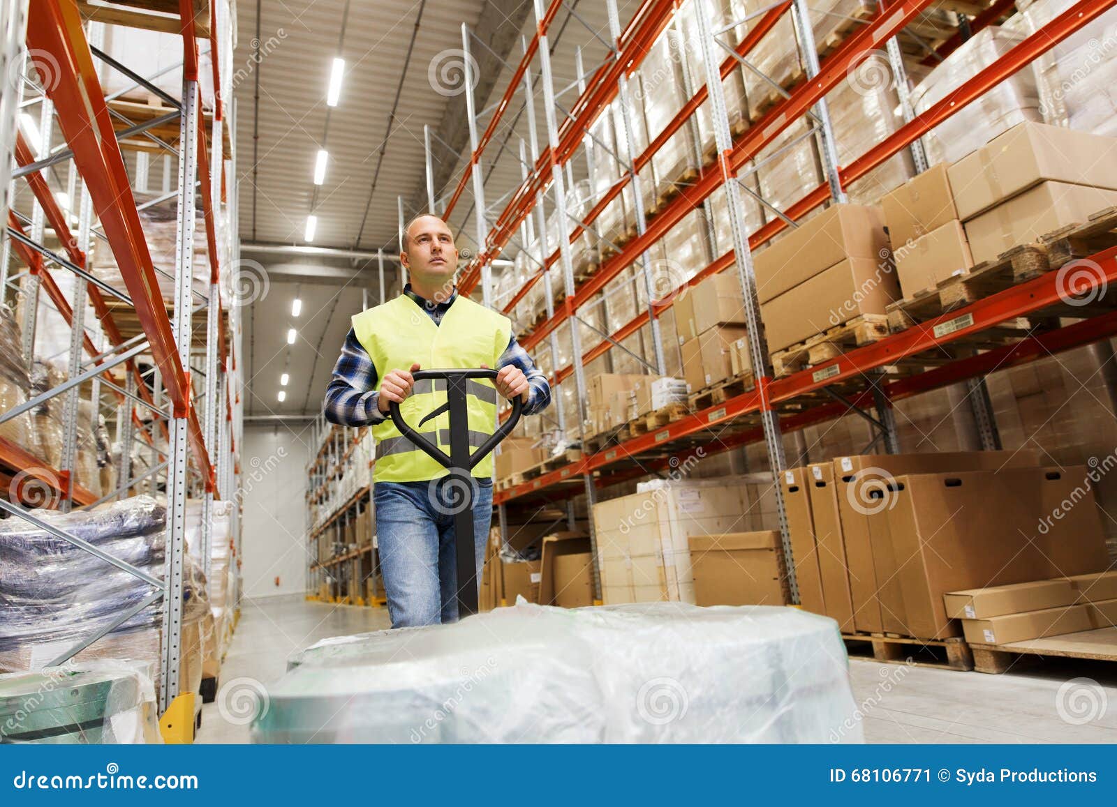 Man Carrying Loader with Goods at Warehouse Stock Image - Image of ...