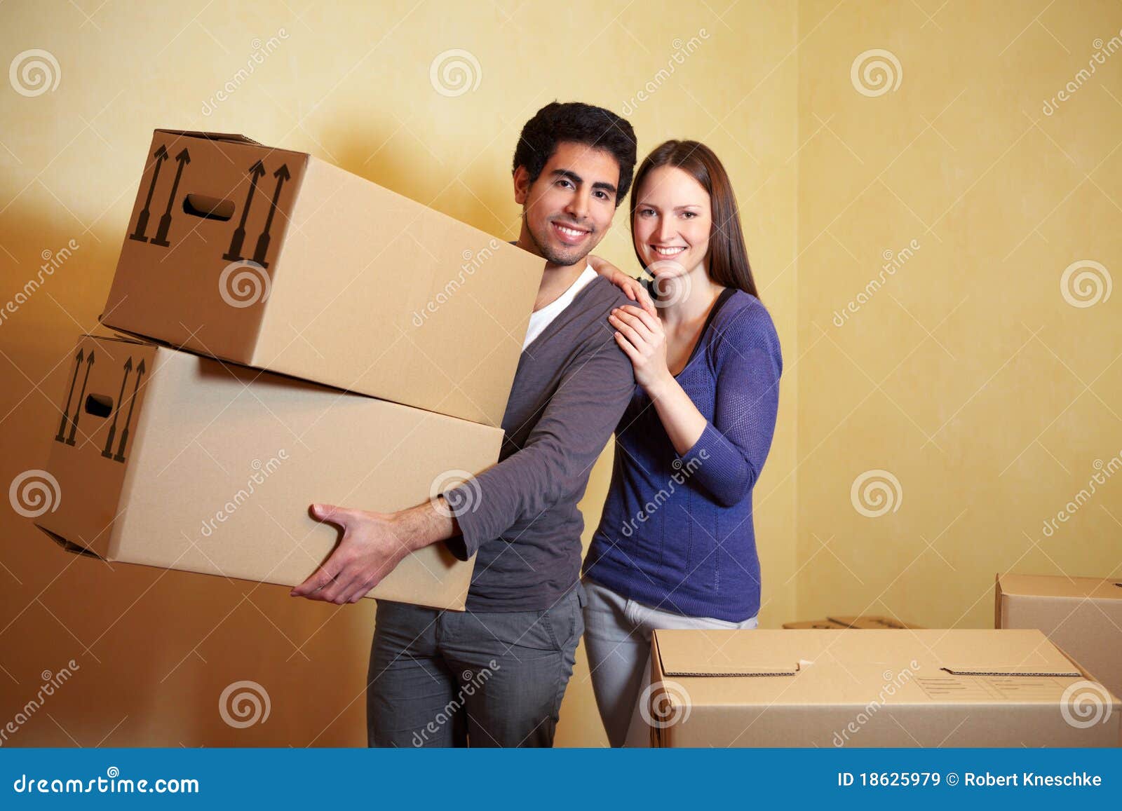 Man carrying moving boxes stock image. Image of packing - 18625979