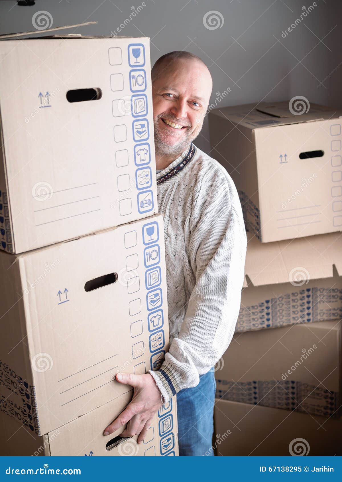 Man carrying moving boxes stock image. Image of relocation - 67138295