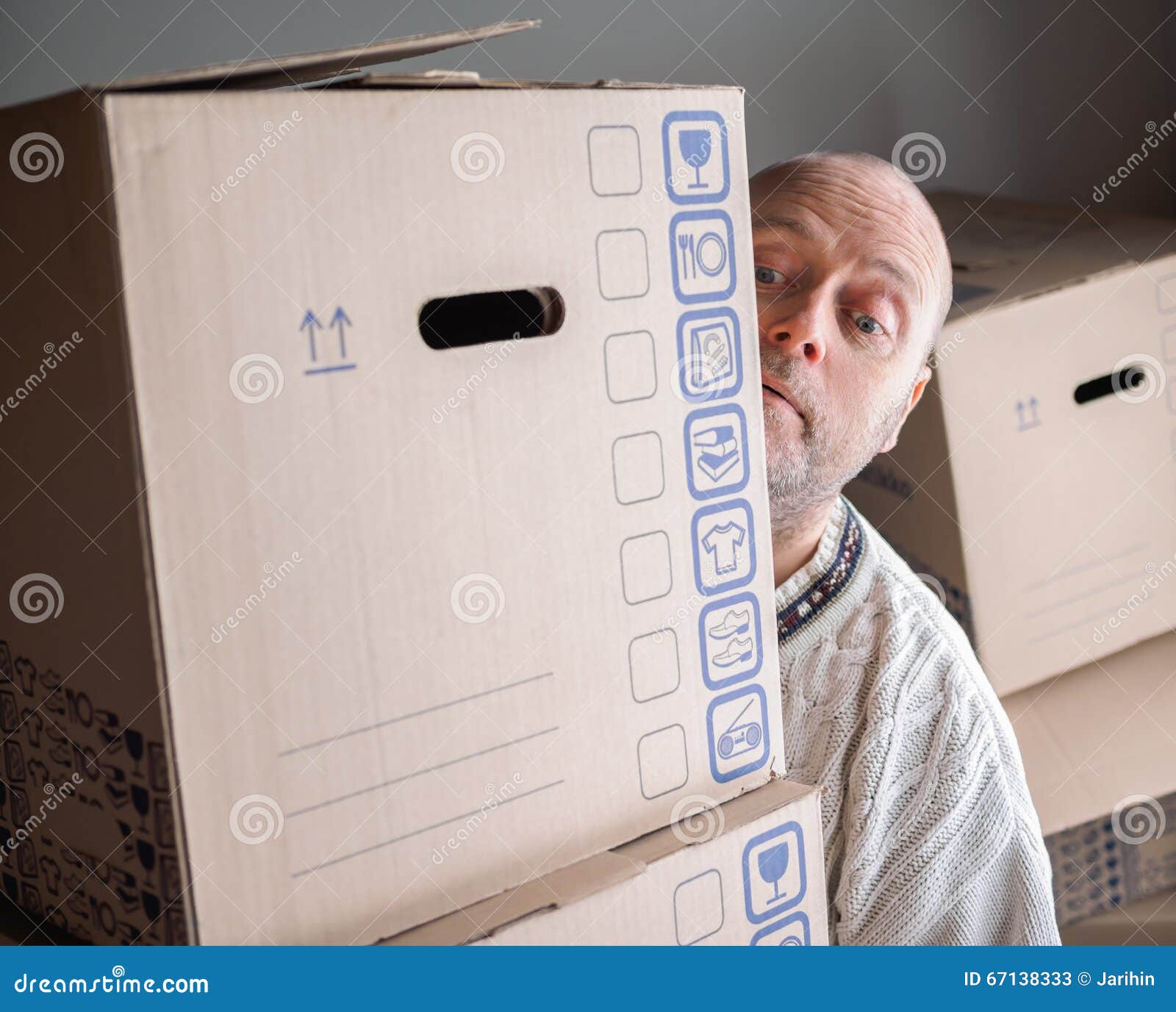 Man carrying moving boxes stock image. Image of caucasian - 67138333