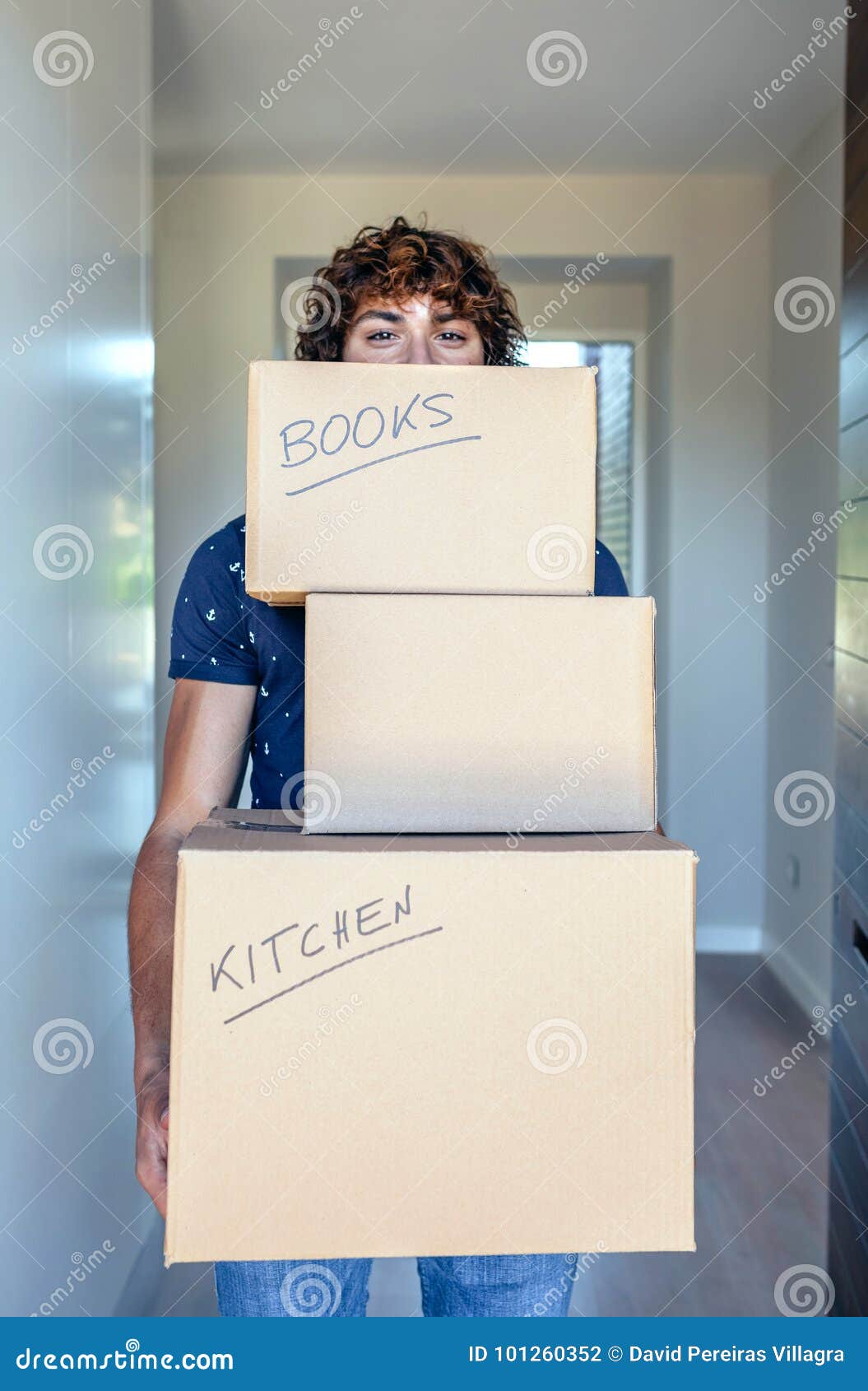 Man carrying moving boxes stock photo. Image of household - 101260352