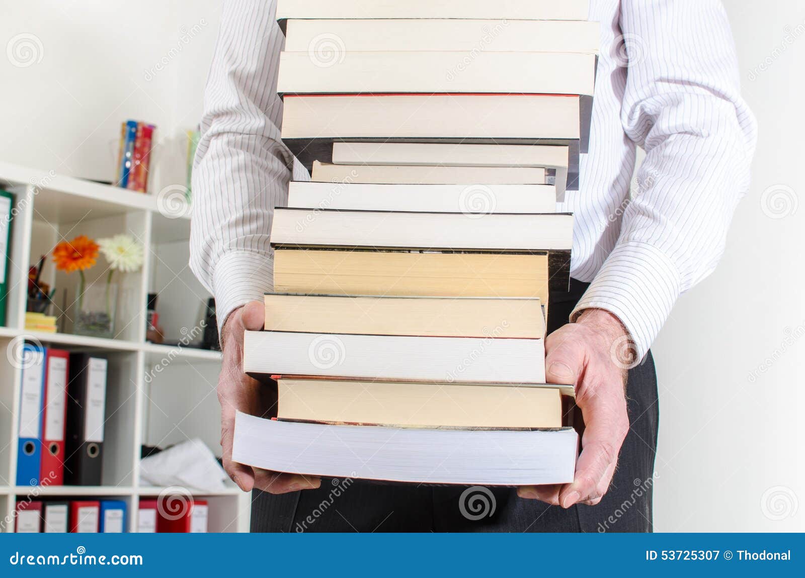 Man Carrying a Pile of Books Stock Image - Image of librarian, study ...