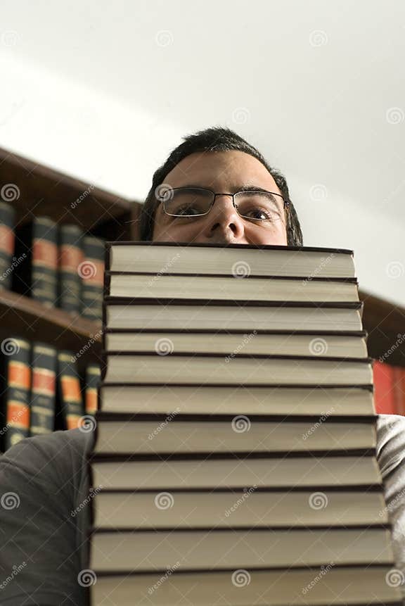 Man Carrying Stack of Books - Vertical Stock Image - Image of latin ...