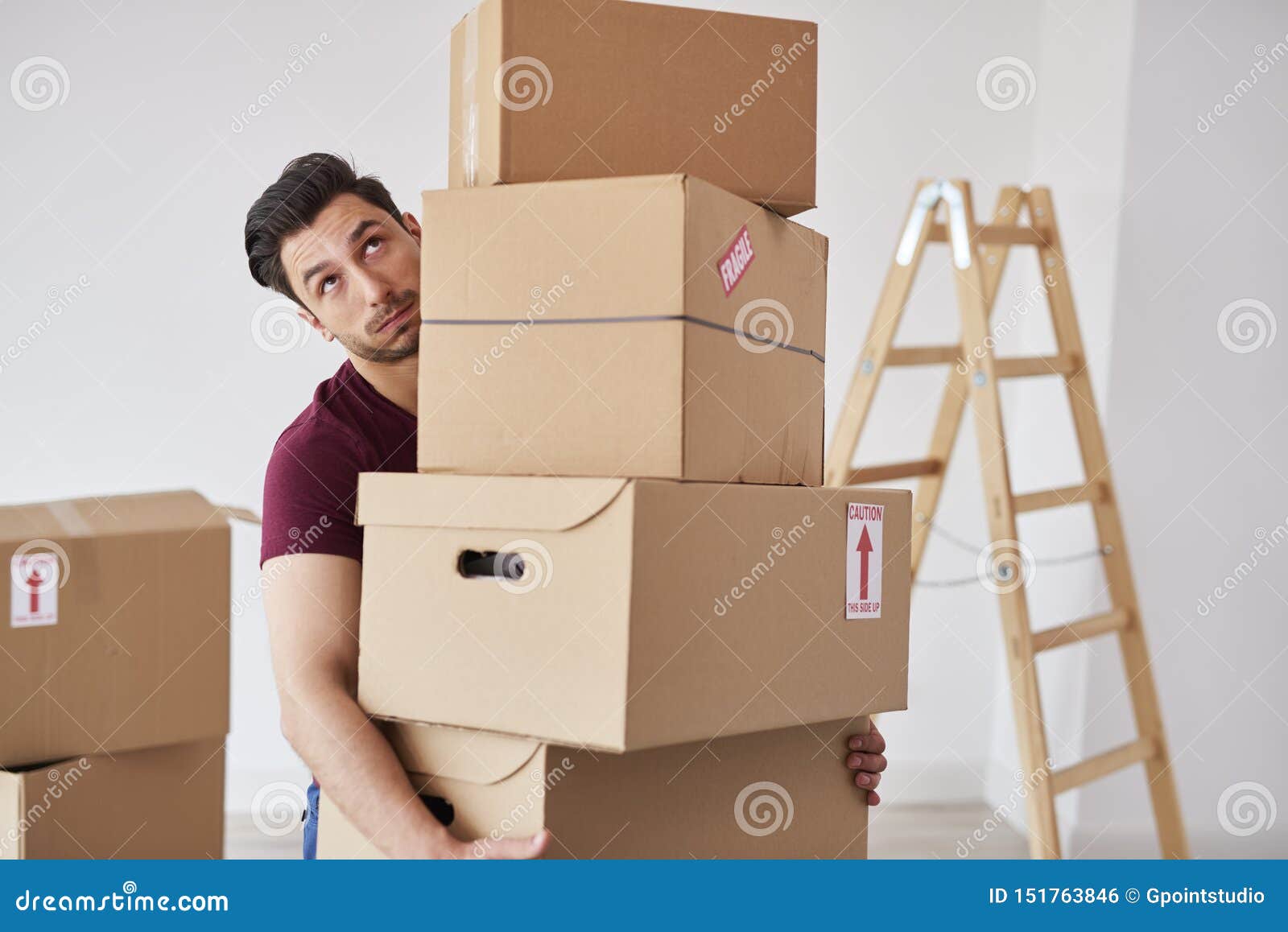 Man Carrying Stack of Heavy Cardboard Boxes Stock Photo - Image of copy ...