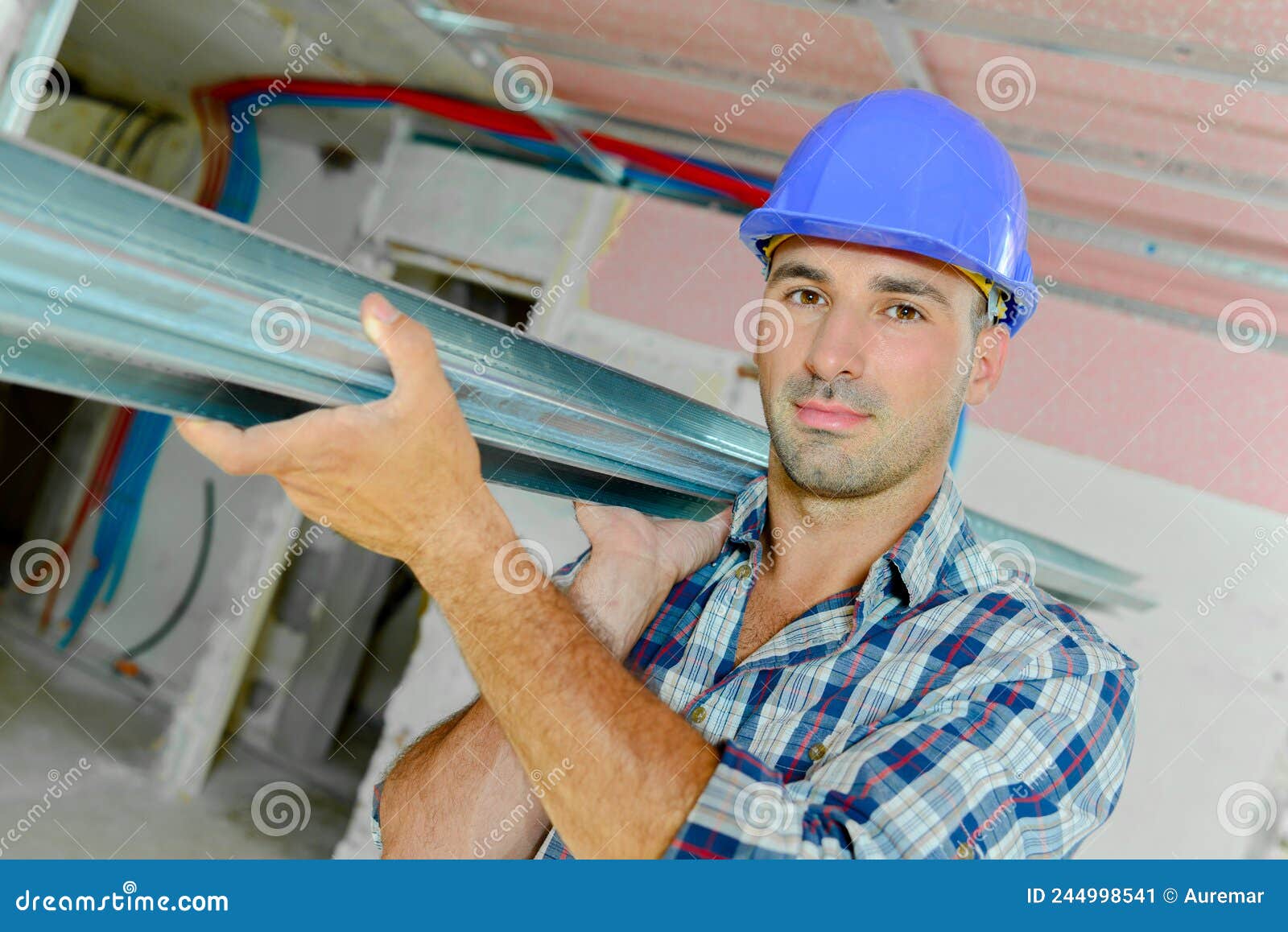 Man carrying steel frame stock image. Image of skill - 244998541