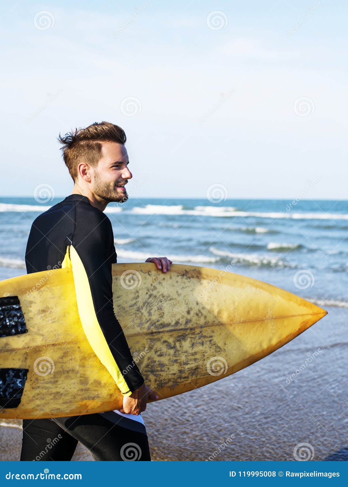 A man carrying a surfboard stock photo. Image of adventure - 119995008