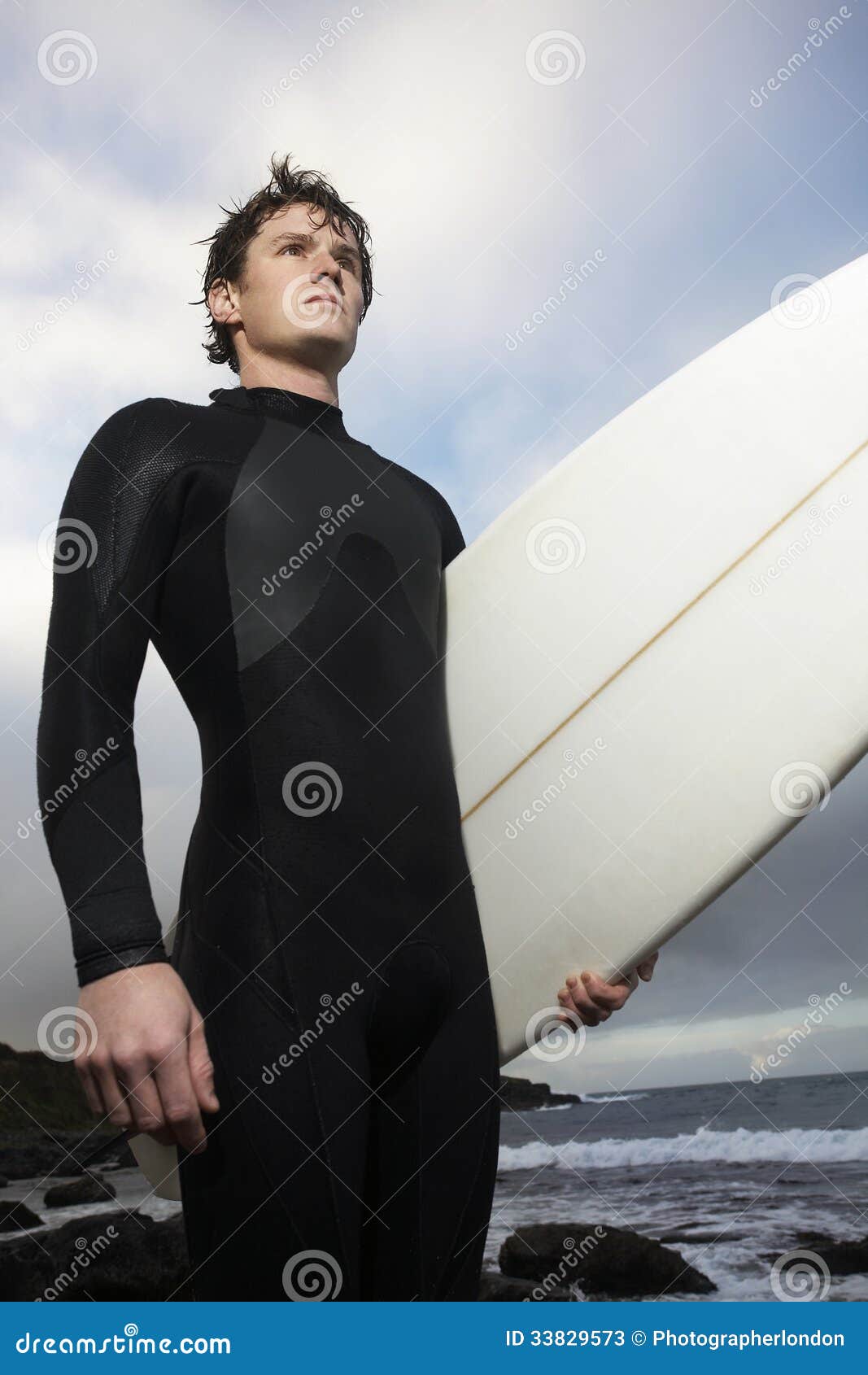 Man Carrying Surfboard on Beach Stock Image - Image of carrying, summer ...