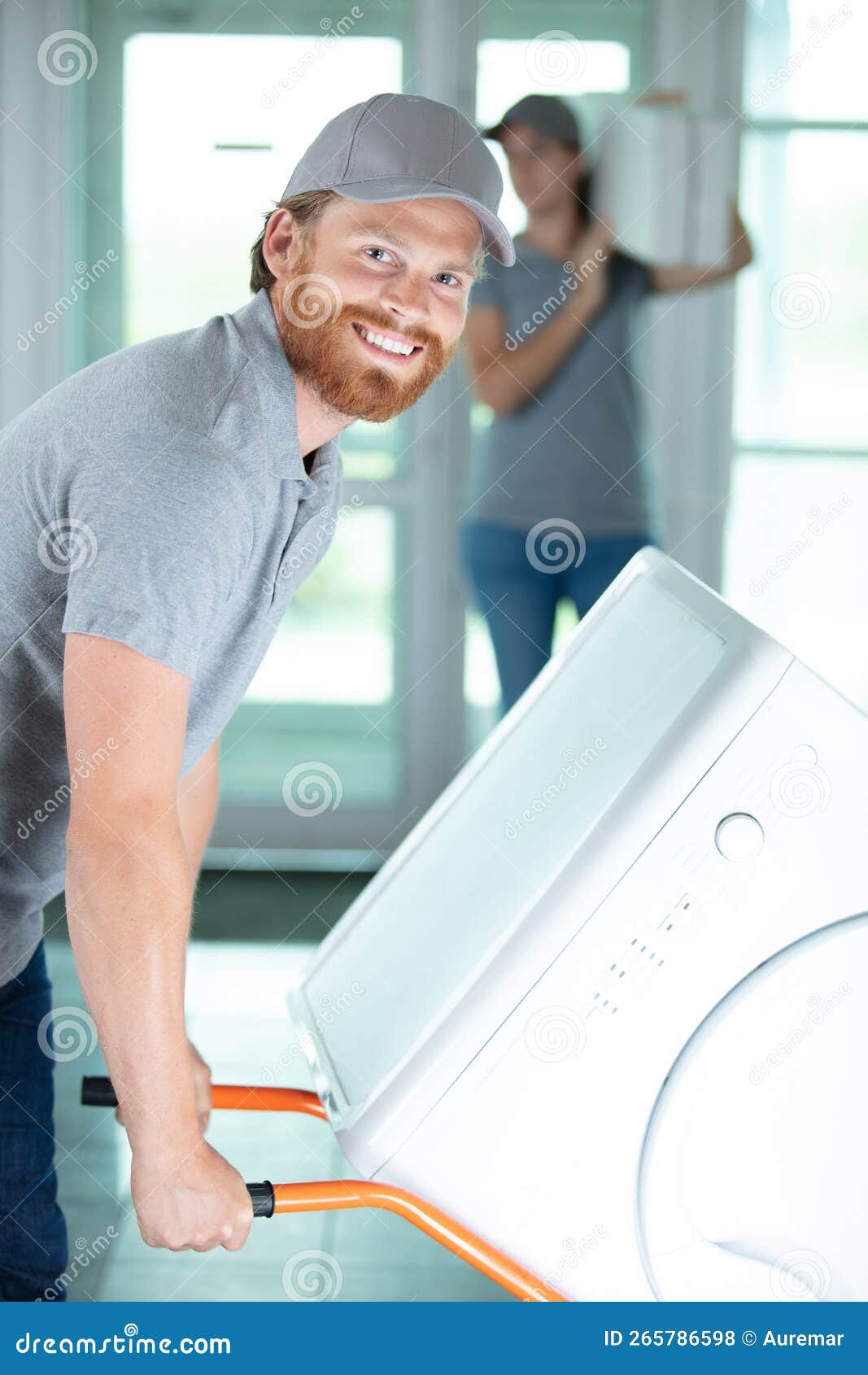 Man Carrying Washing Machine Stock Photo - Image of male, repair: 265786598